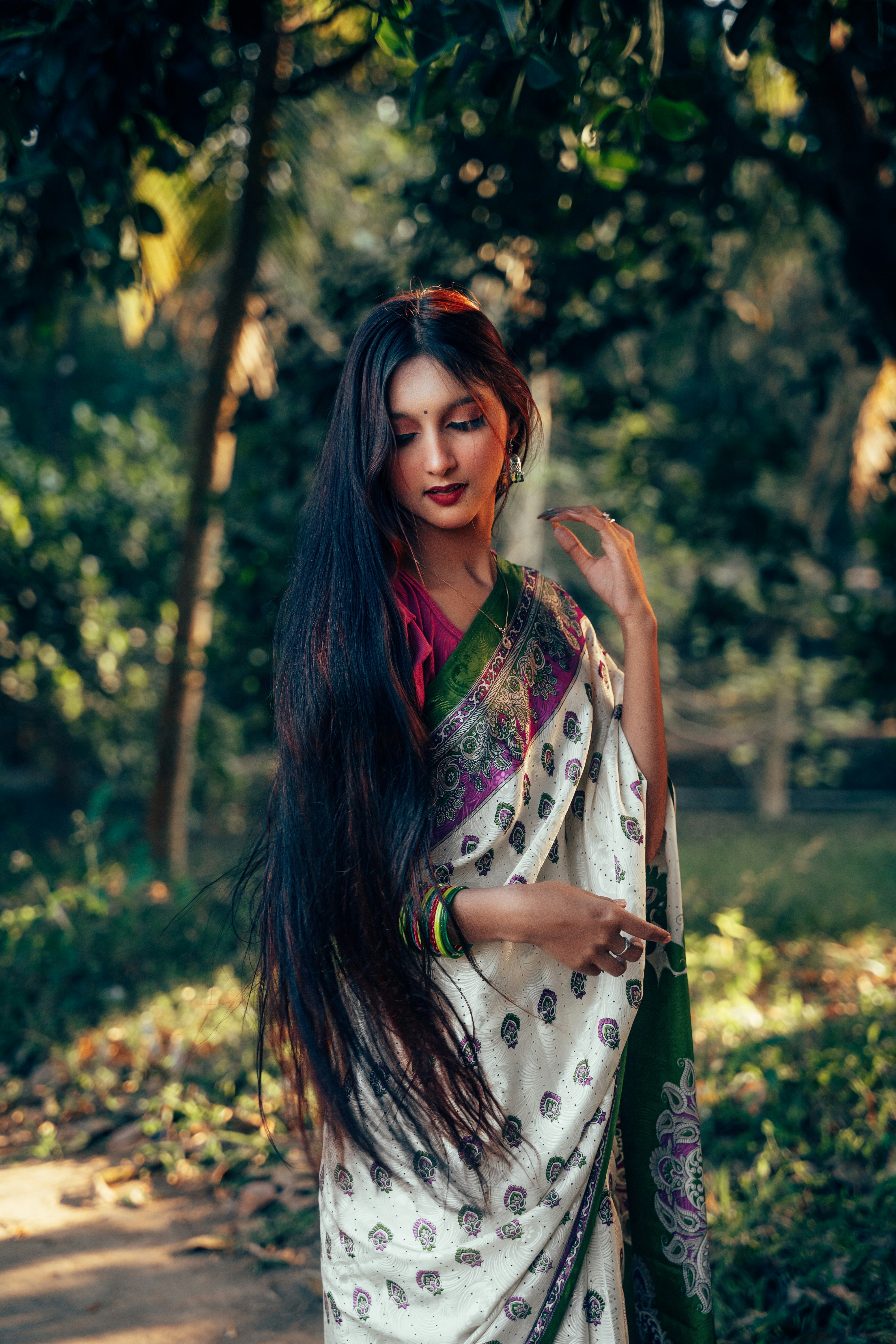 A woman in a sari is posing for a picture photo – Free Comilla Image on ...