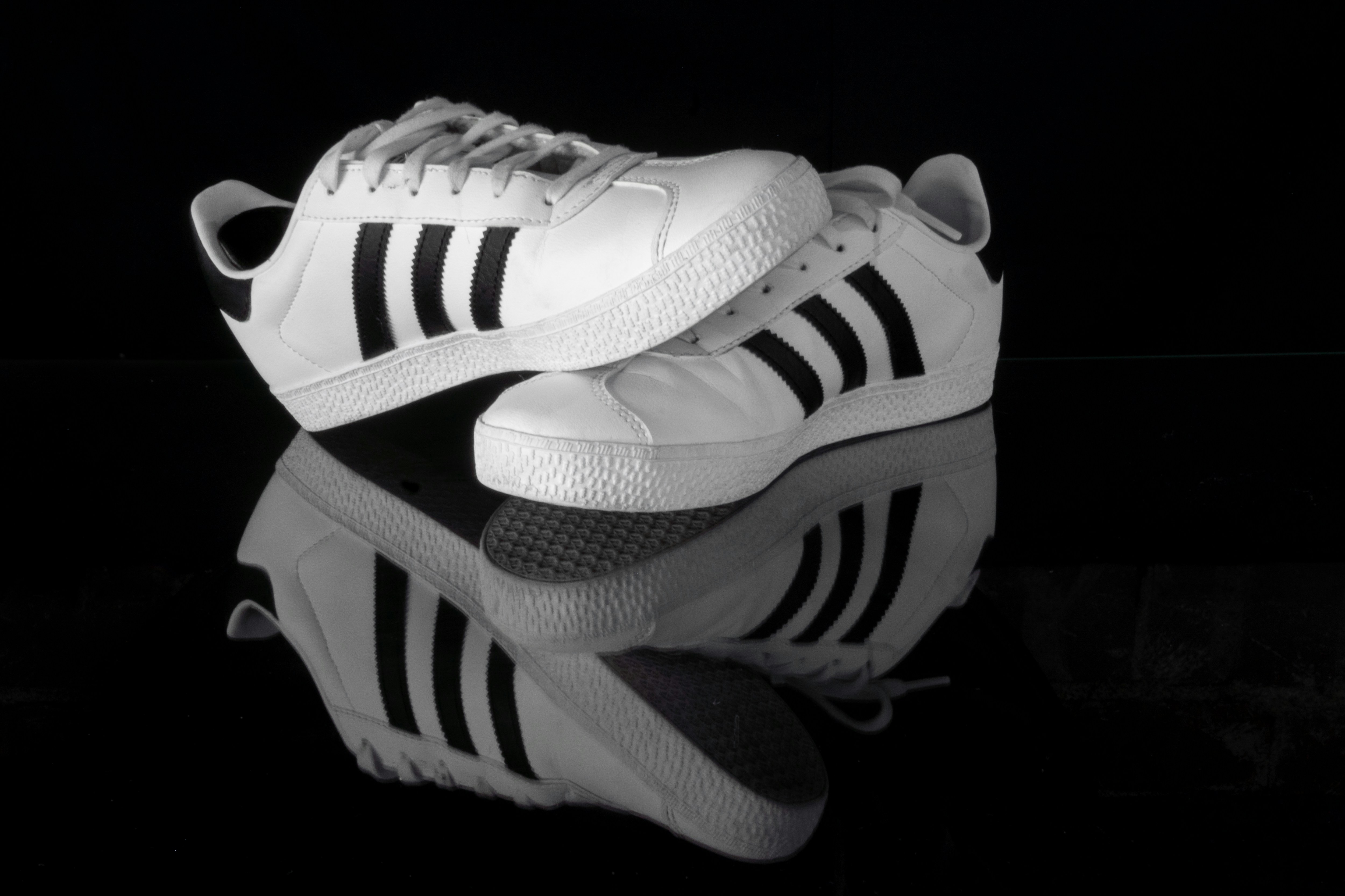 A black and white photo of a pair of shoes photo – Free Kickers Image ...
