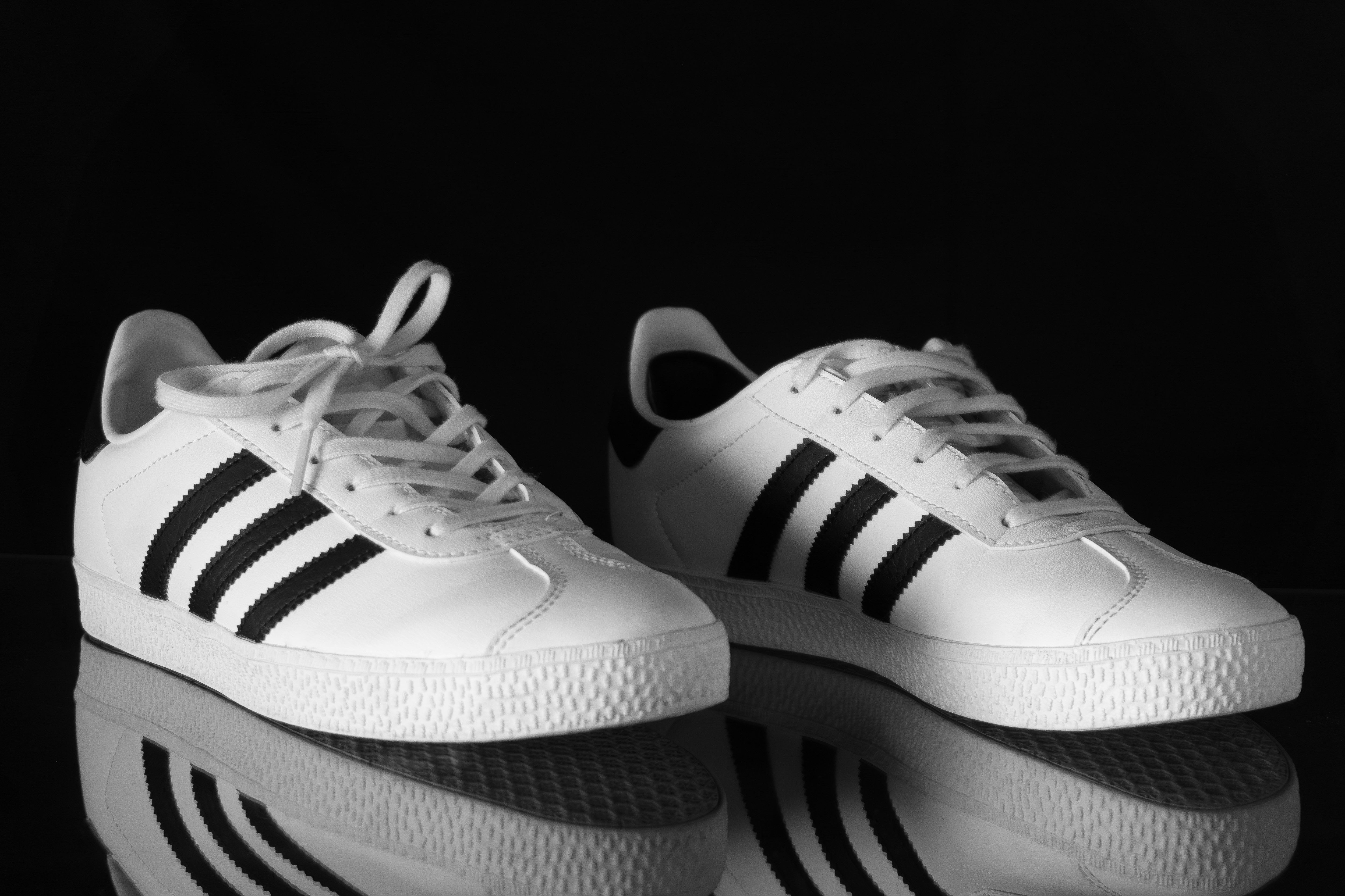 A black and white photo of a pair of shoes photo – Free Kickers Image ...