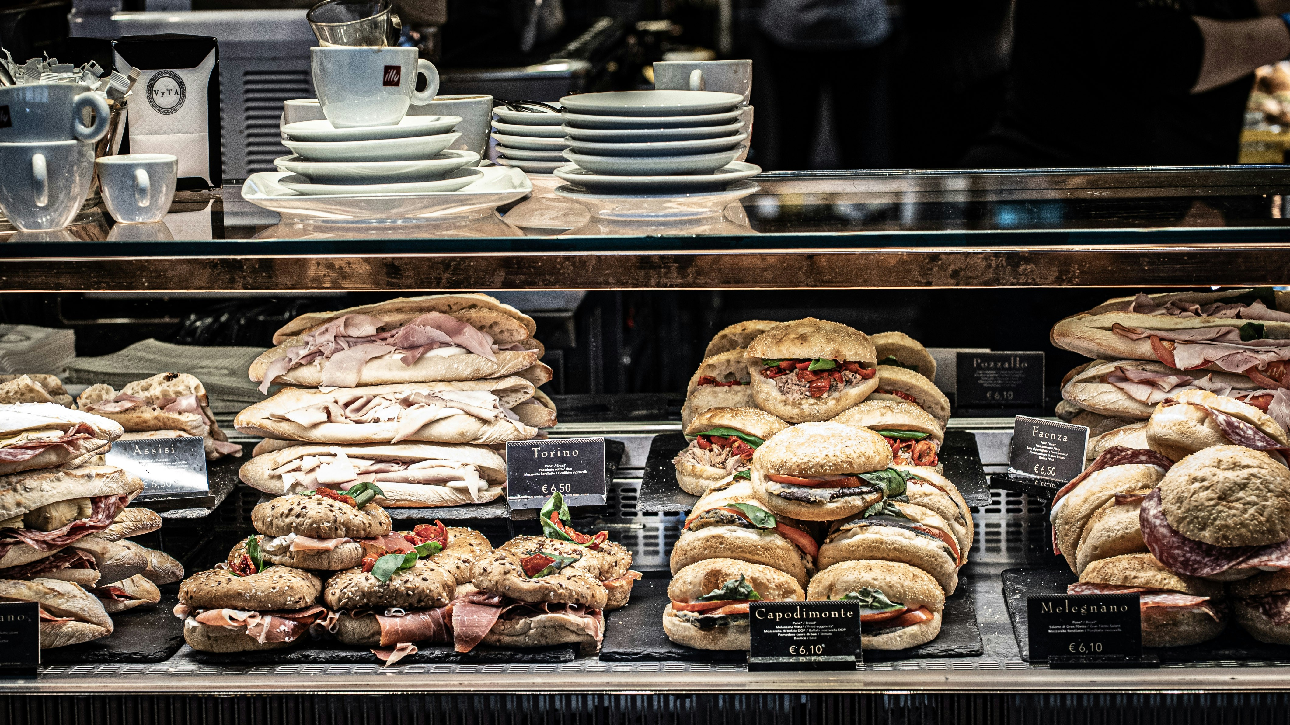 A display case filled with lots of sandwiches photo – Free Food Image ...