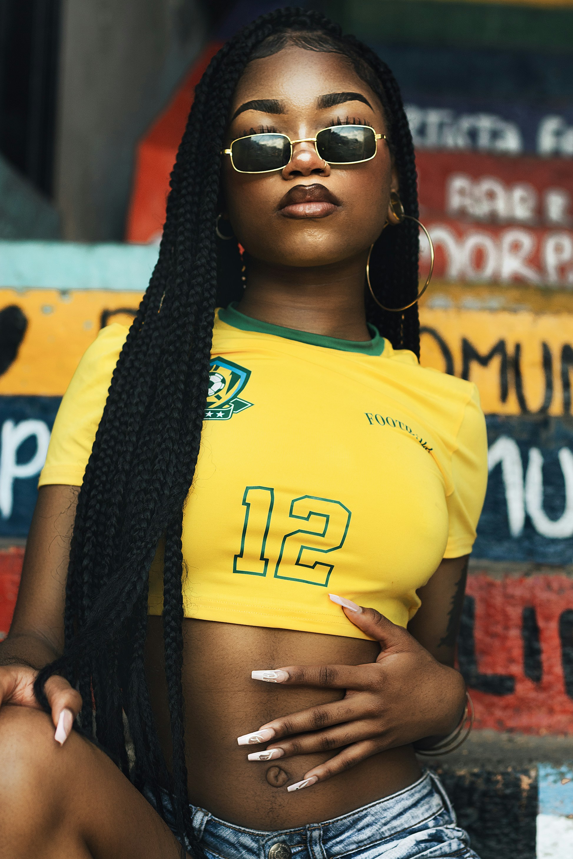 Bold in Yellow: Portrait Amid Graffiti-Colored Steps