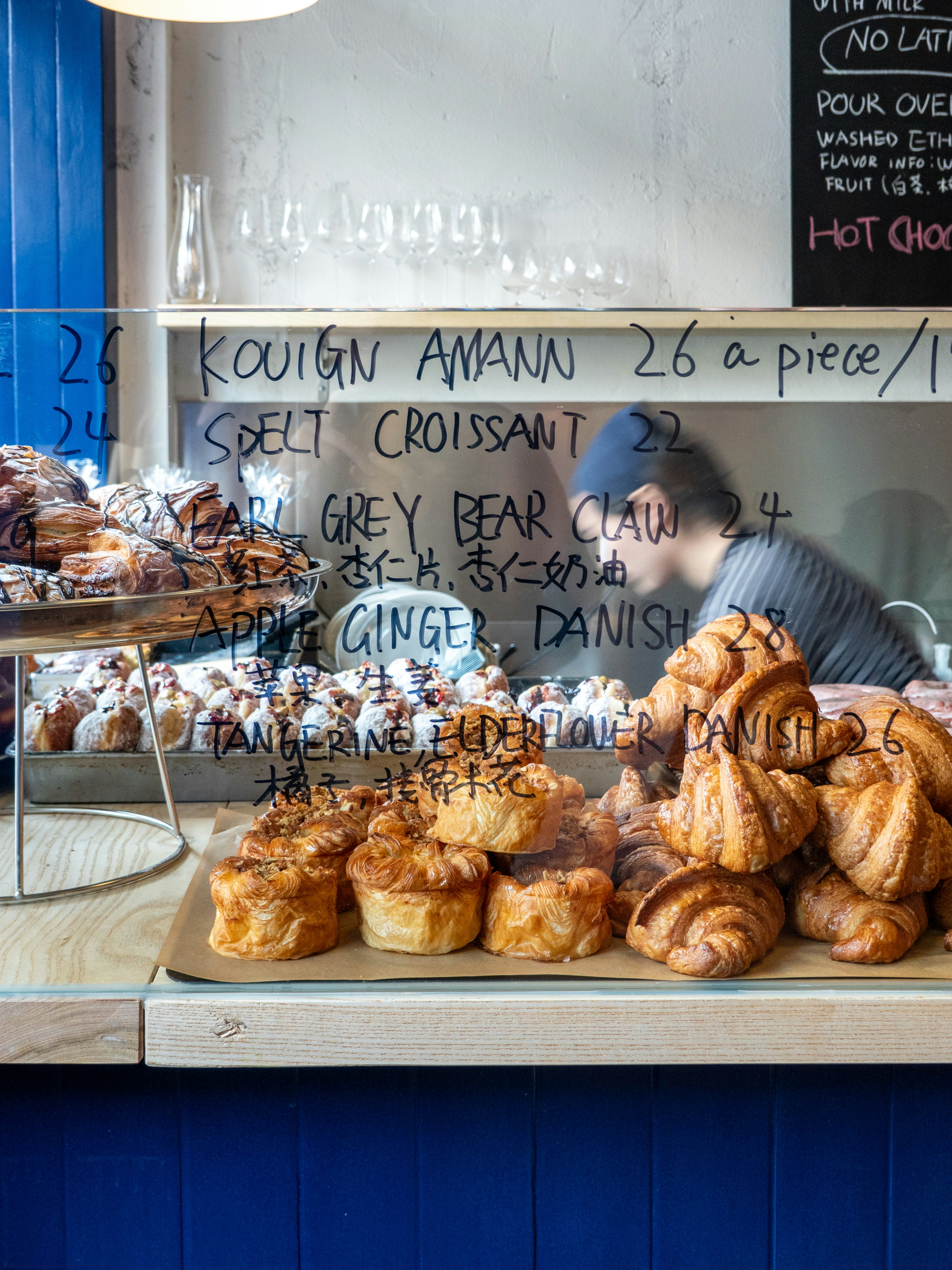 Pane and Pastry: Golden Croissants Framed by a Bakery Window