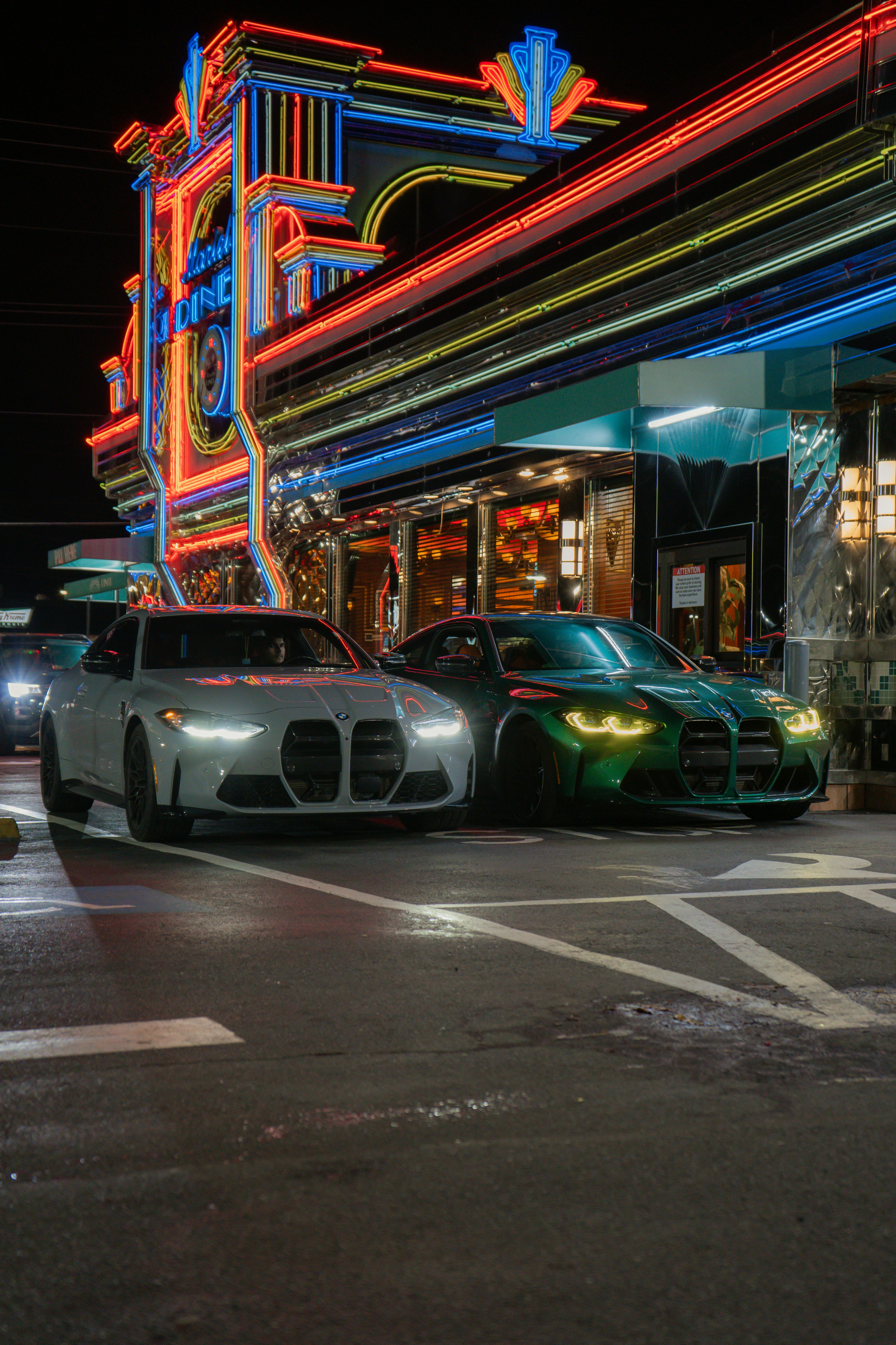 Neon Arches and Twin Rivals: Night Run by a Retro Diner