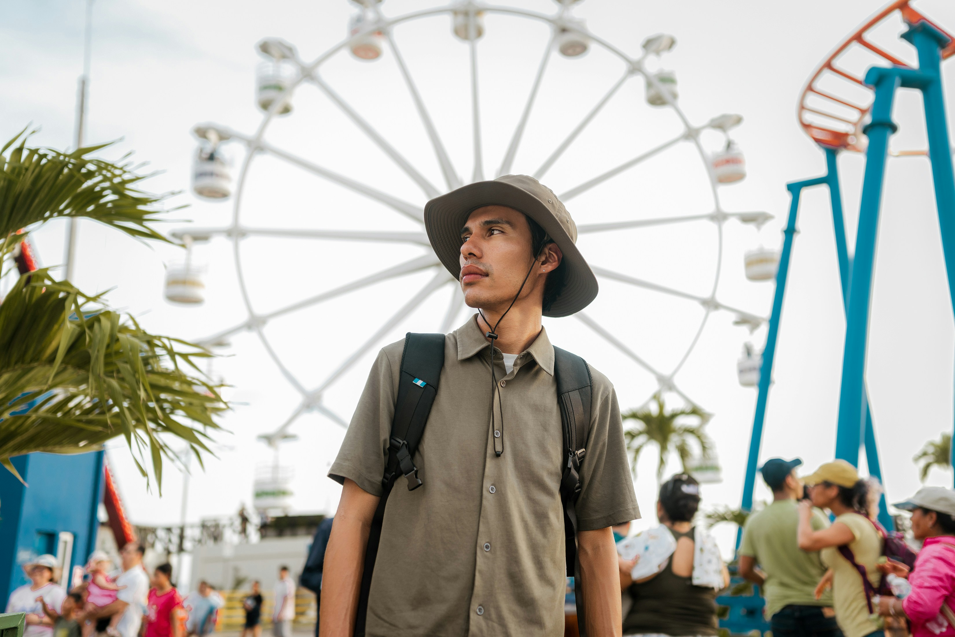 Midway Focus: A Quiet Portrait Beneath the Ferris Wheel