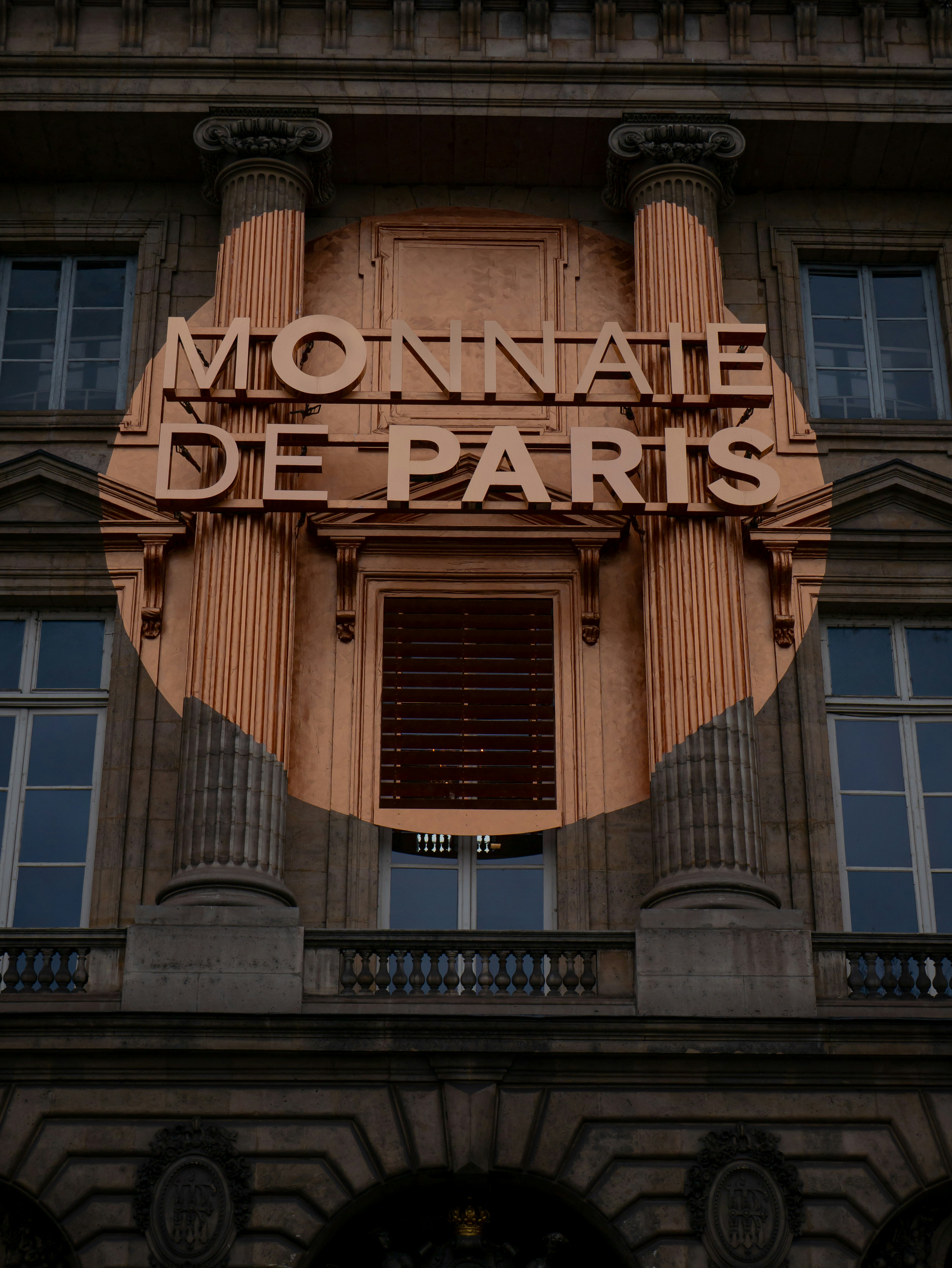 Circular Spotlight on Monnaie de Paris Facade
