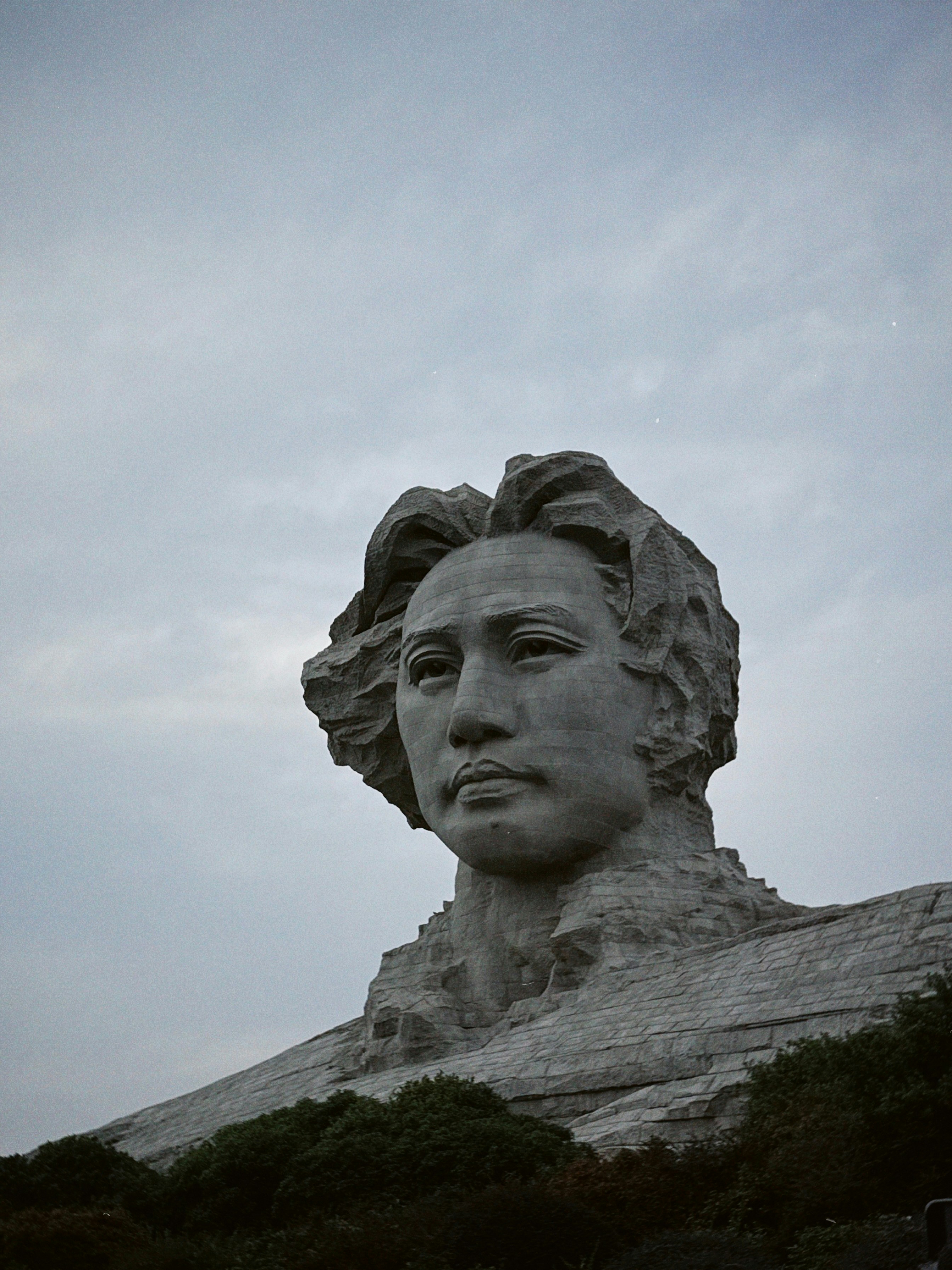 Giant Gaze: The Monumental Portrait Reaches Toward the Sky