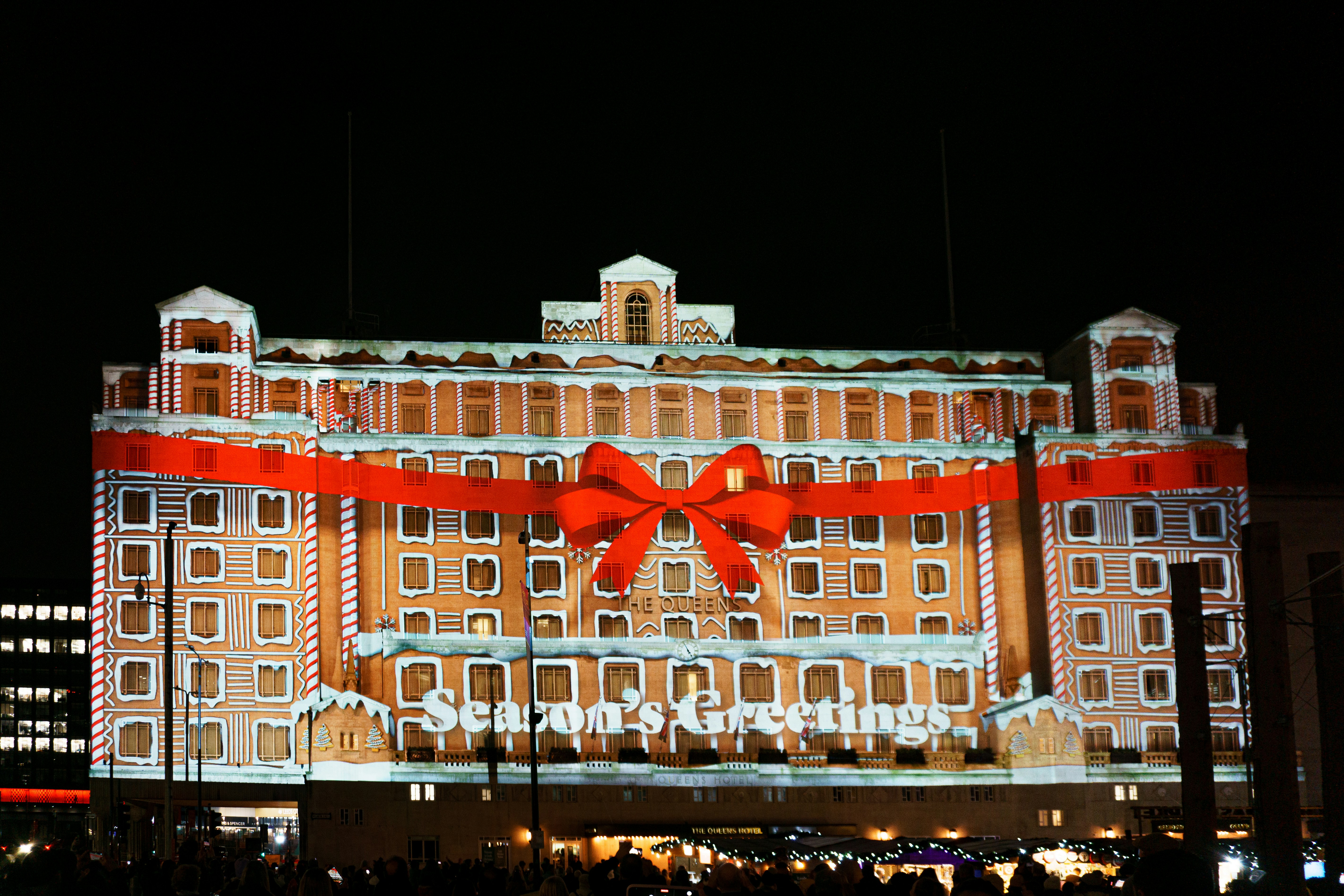 A large building with a red bow on it photo – Free Leeds Image on Unsplash