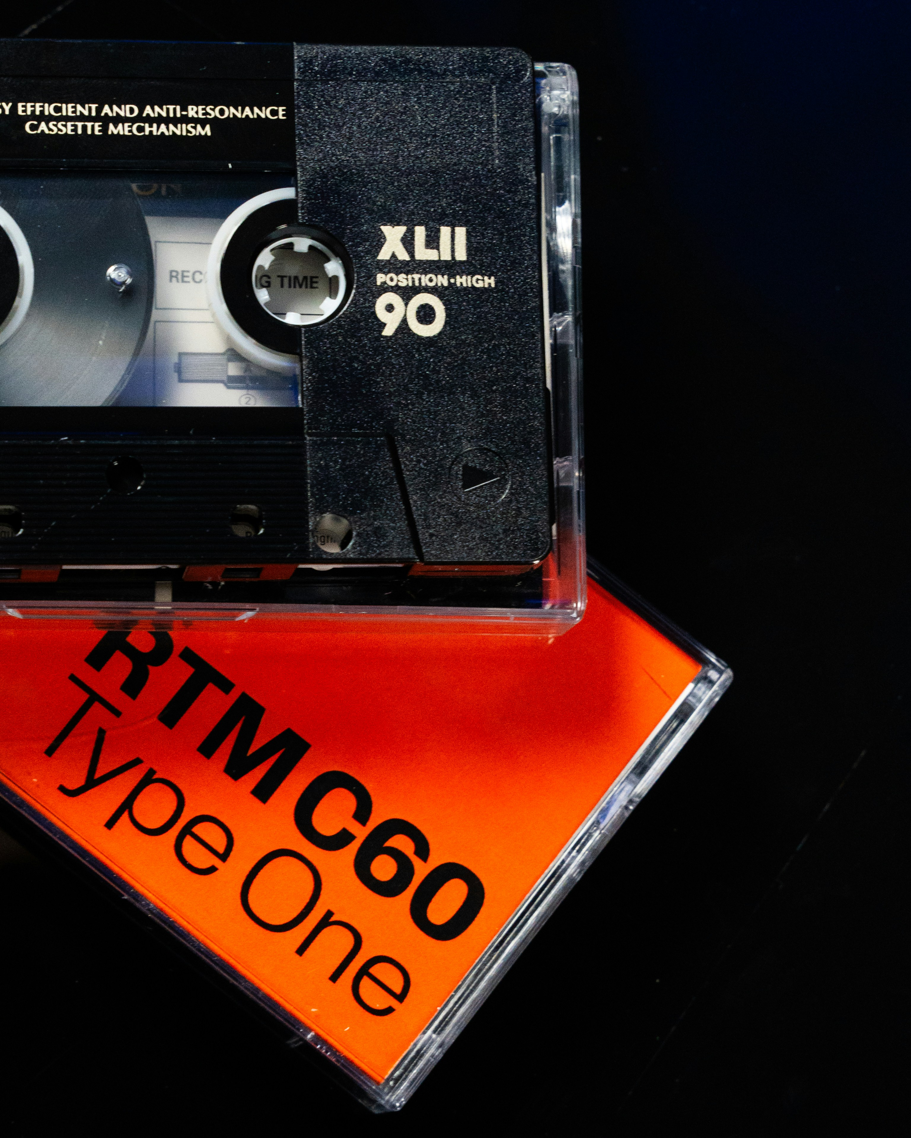Type One Cassette: A Close-Up of Retro Tape's Bold Orange Label