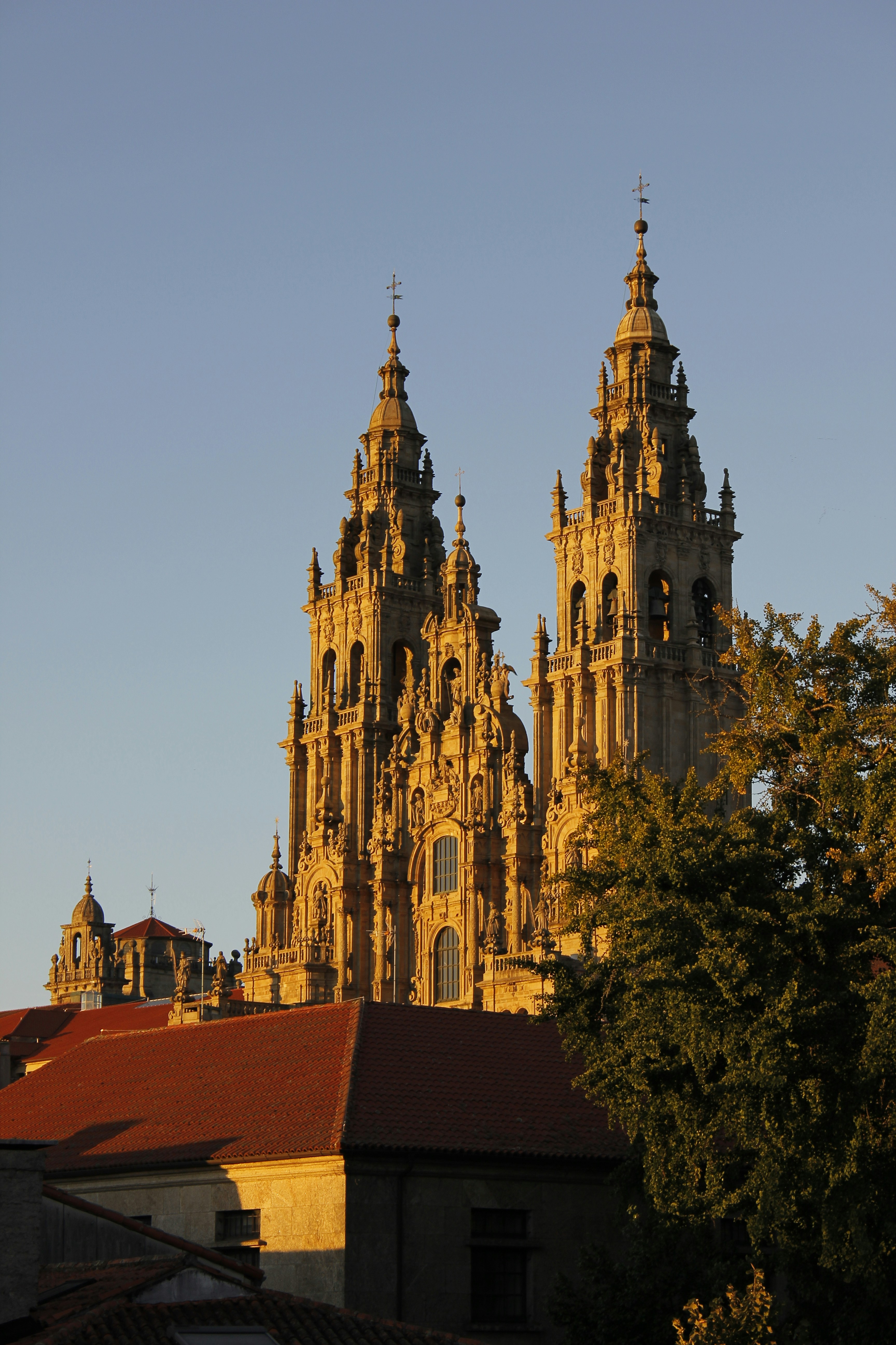 Sunlit Spires: Twin Towers Crown a Baroque Cathedral at Golden Hour