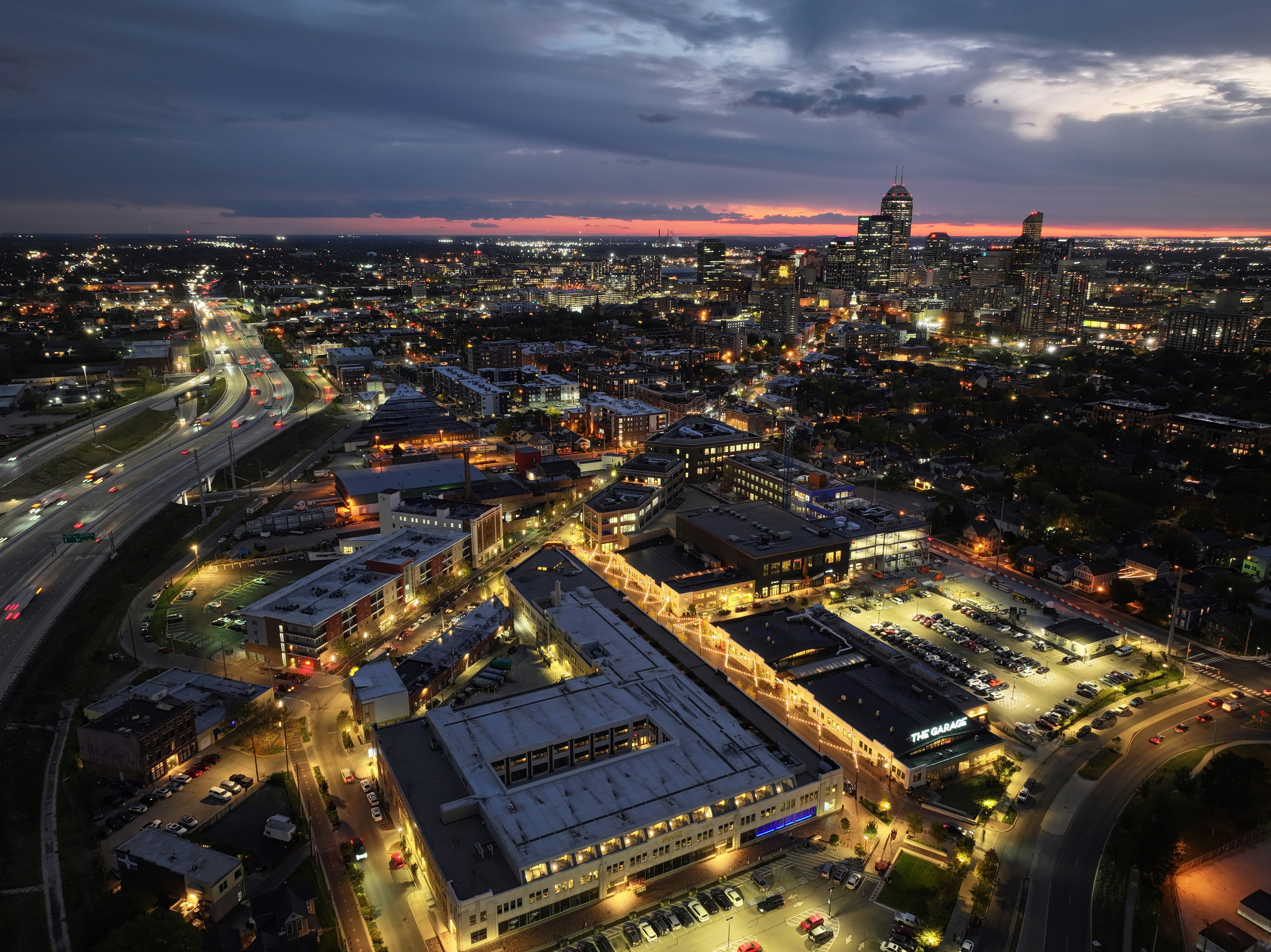 Bottleworks | An aerial view of a city at night