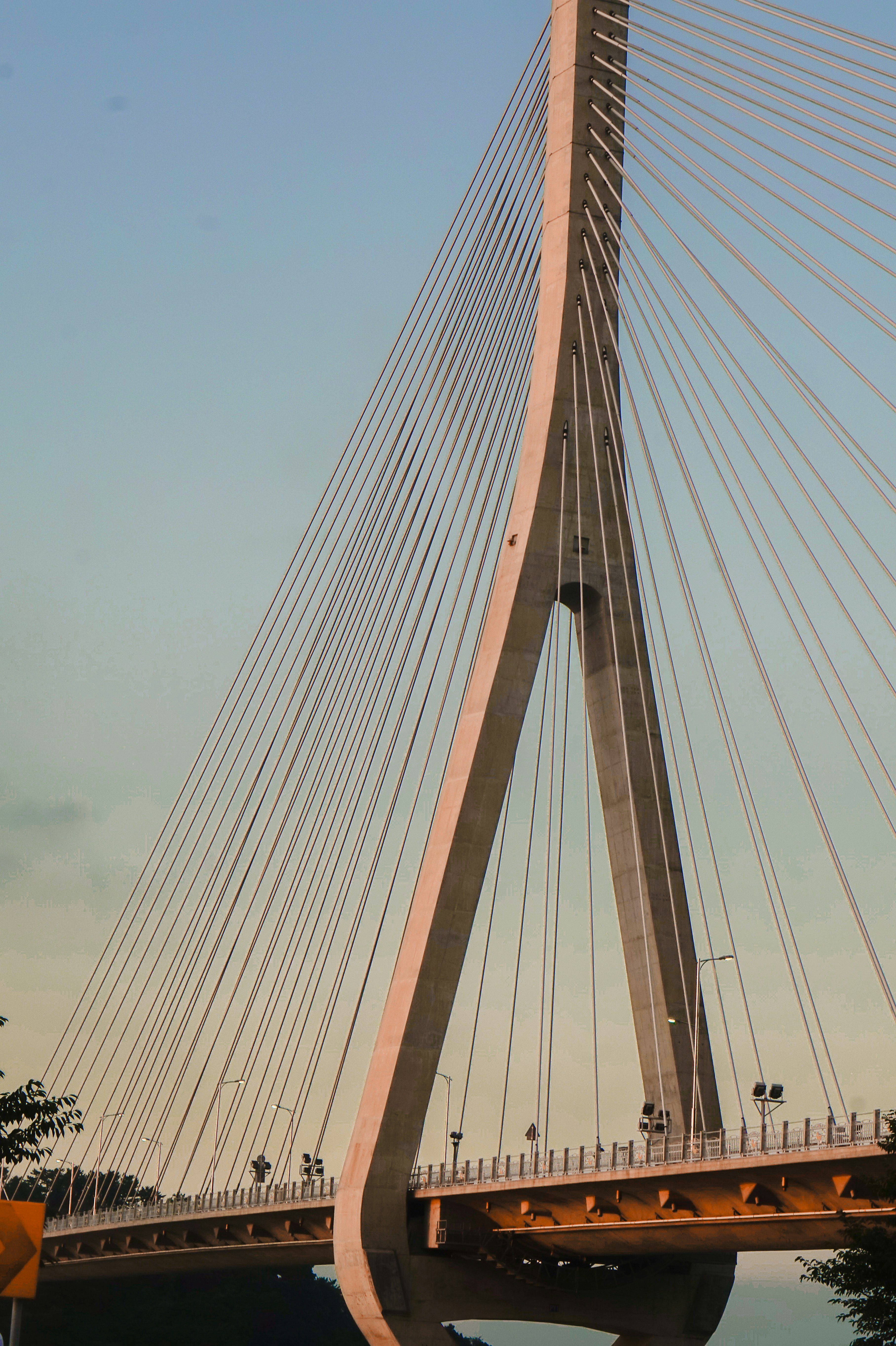 A very tall bridge over a body of water photo – Free Bridge Image on ...