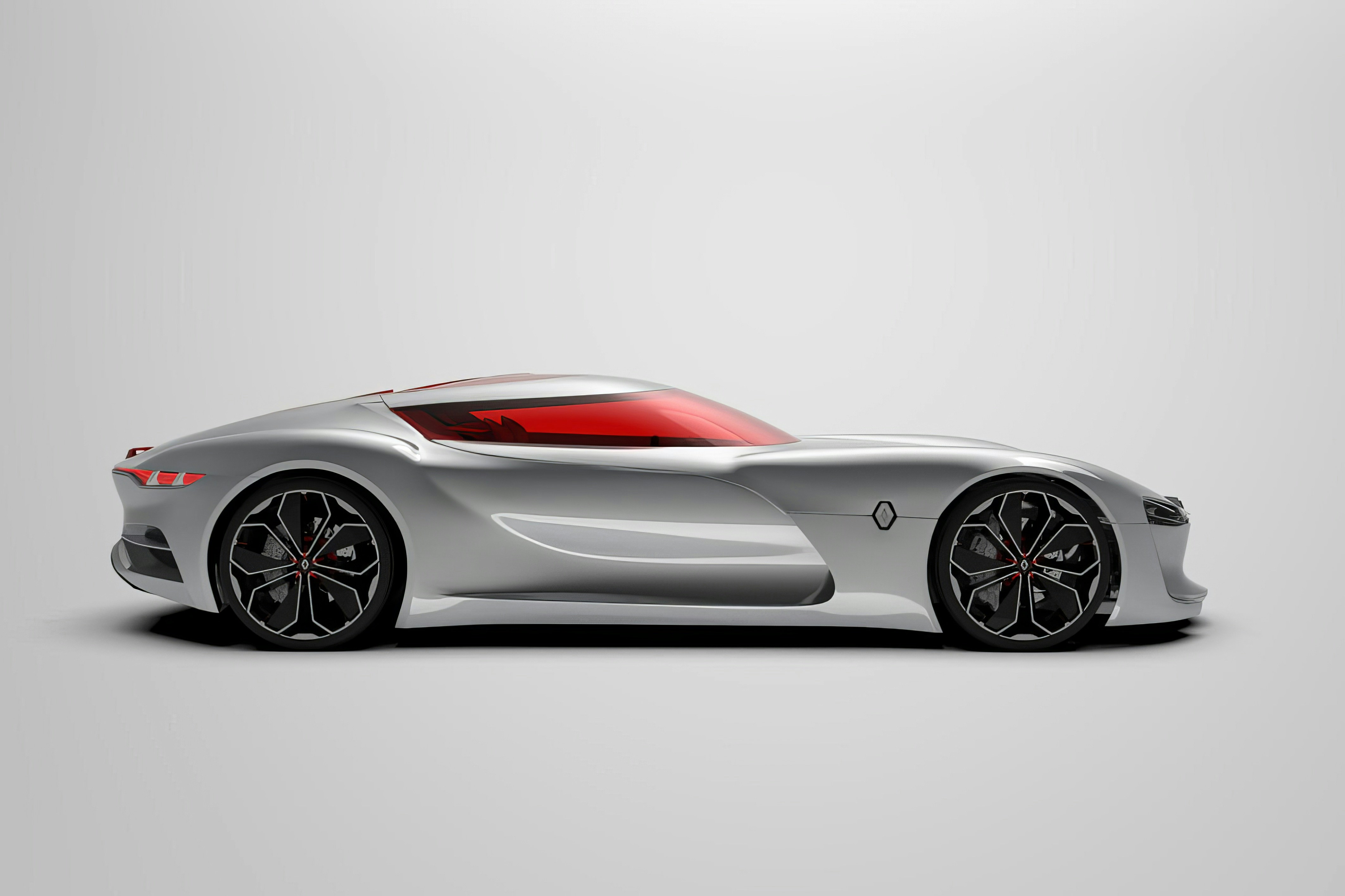 A silver sports car on a gray background photo – Free Car Image on Unsplash