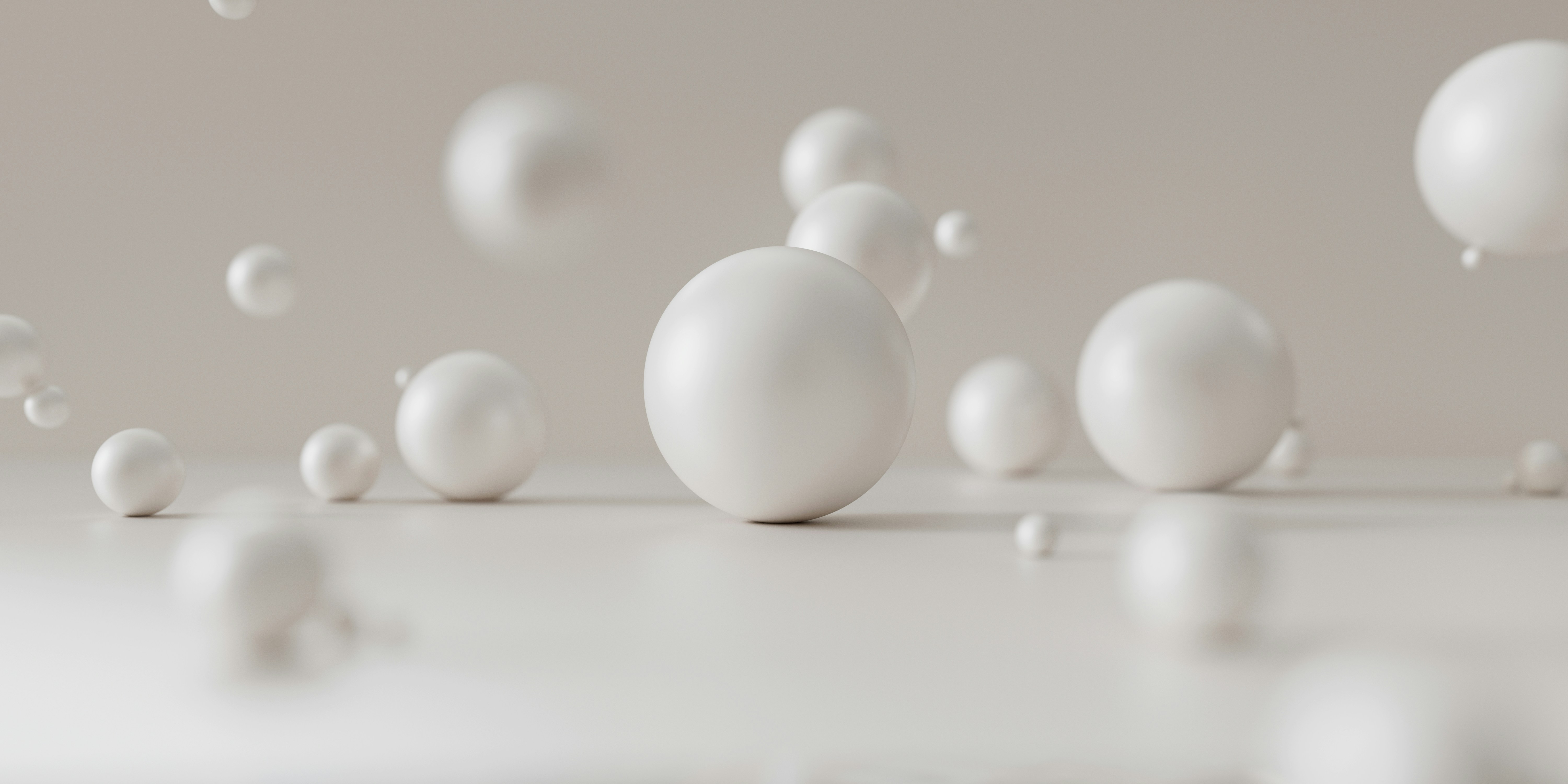 A group of white balls floating in the air photo – Free Desktop ...