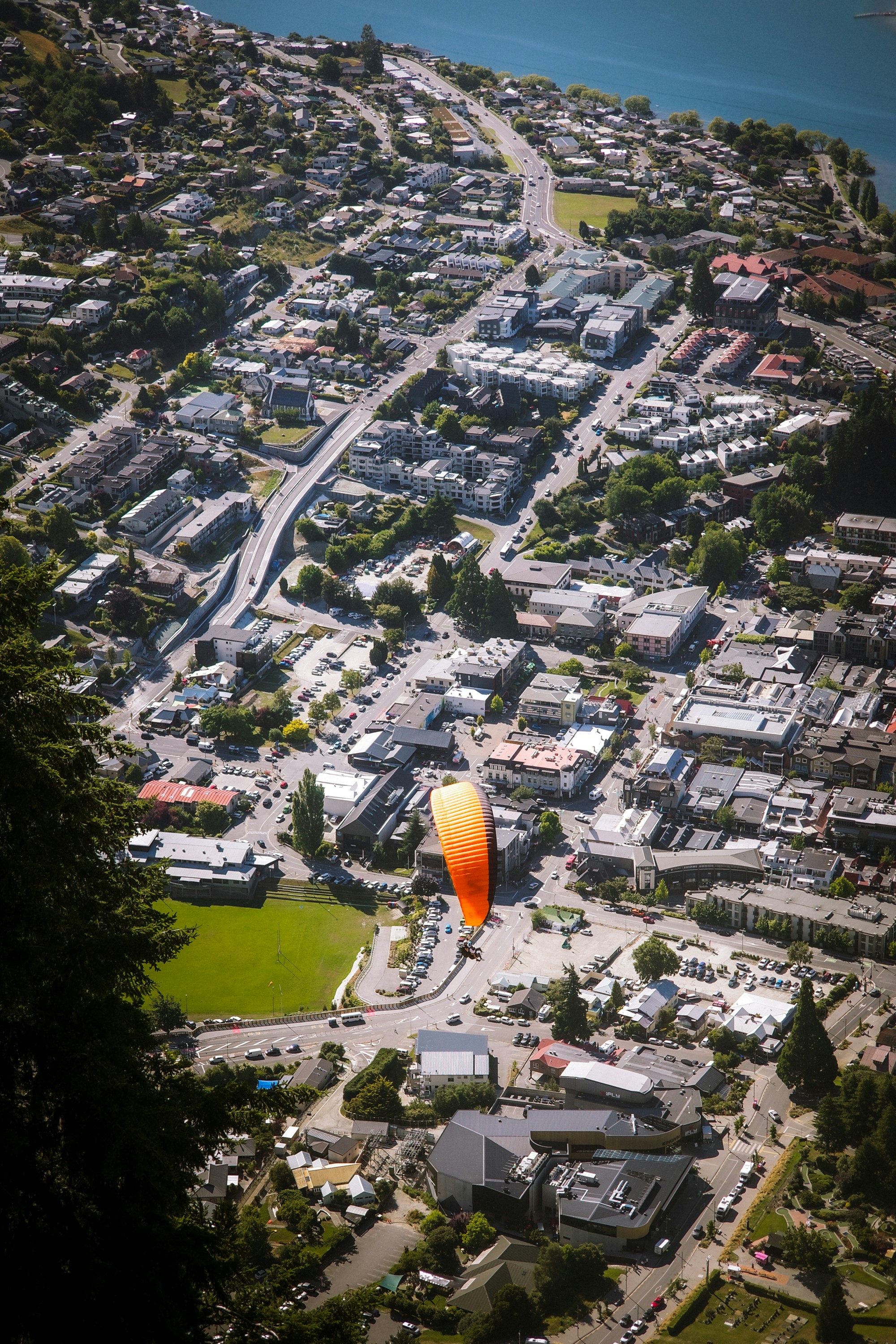 A hot air balloon flying over a city