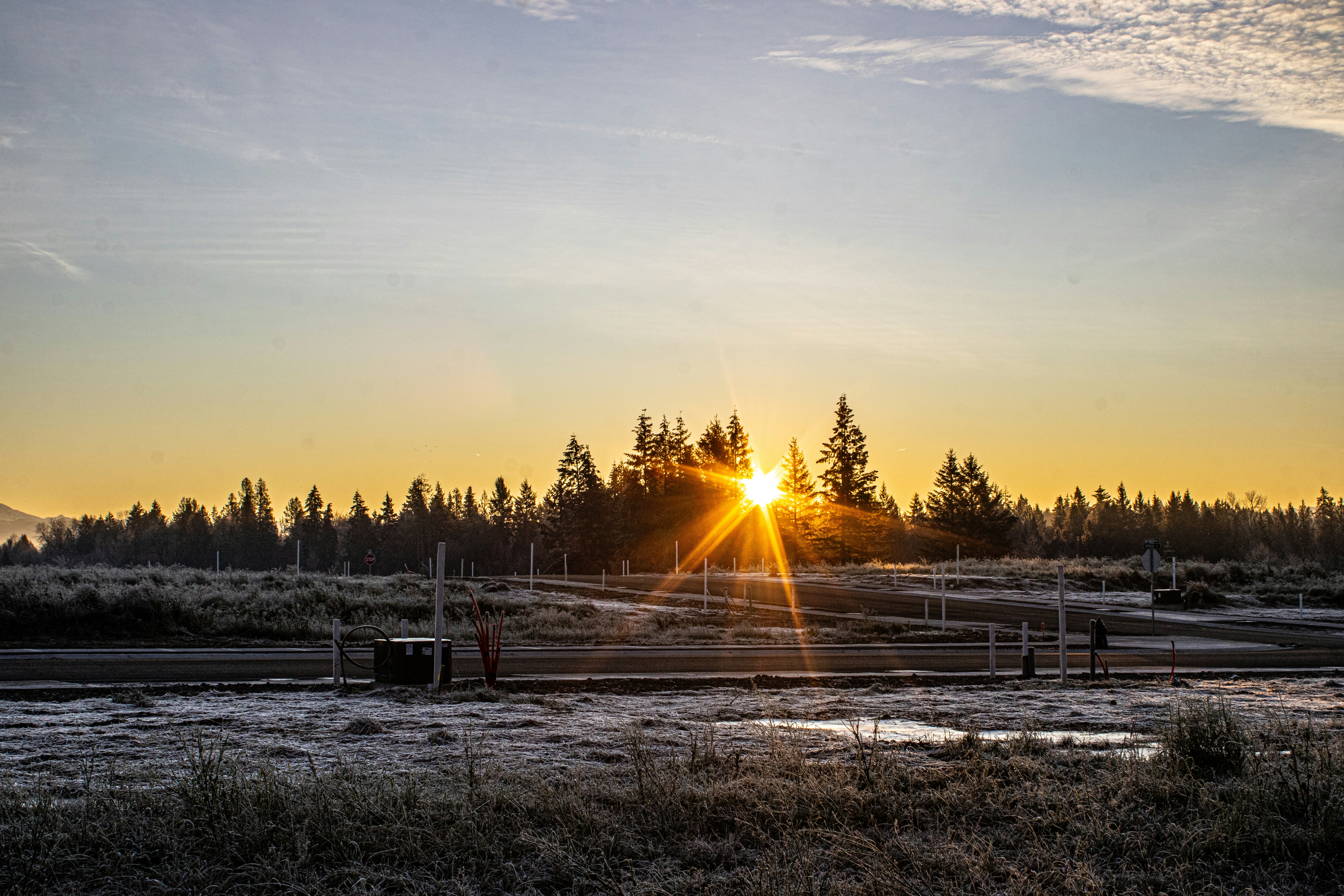 Golden Rays Over Frosted Fields