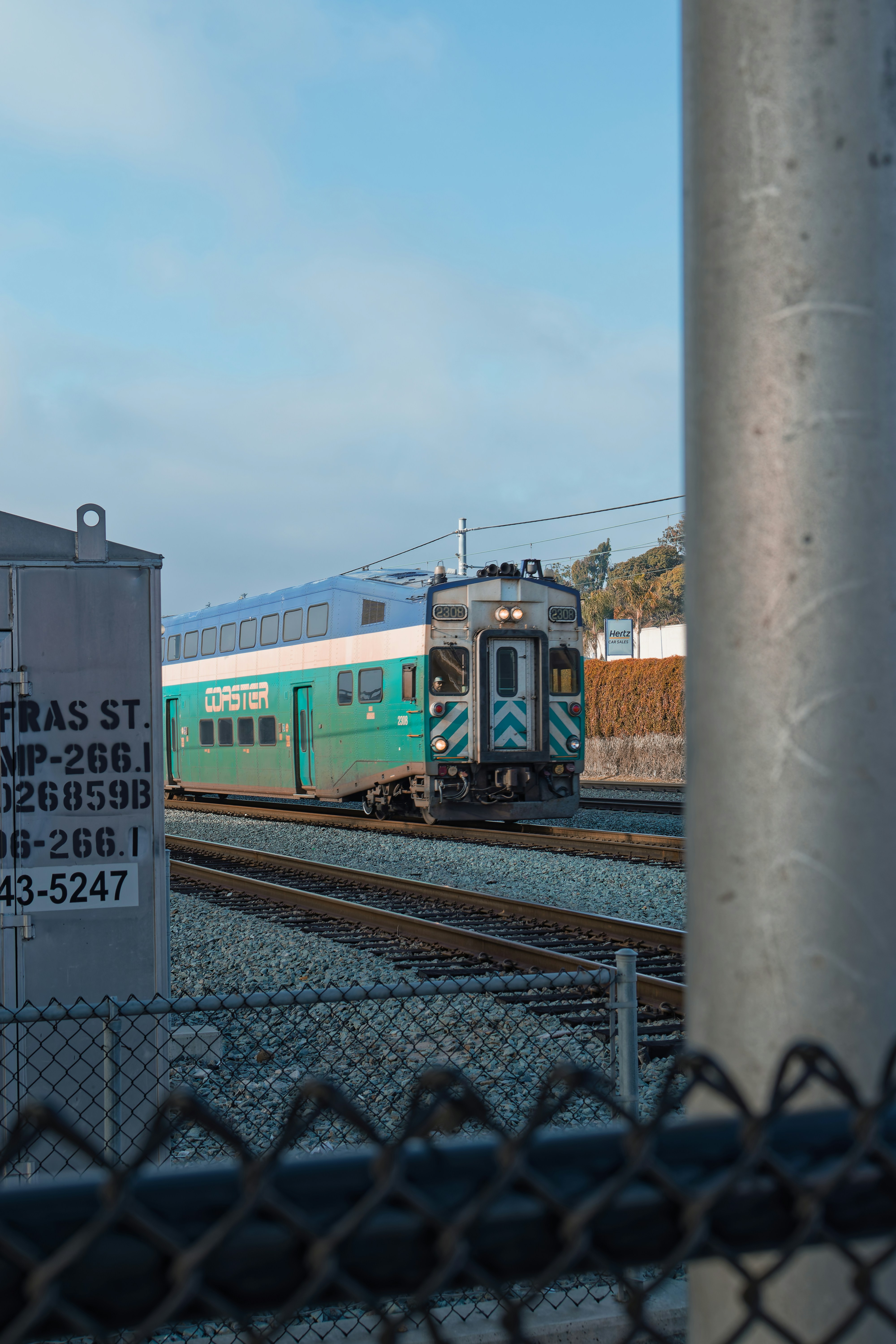 Front-On Turquoise Diesel in a Quiet Rail Yard