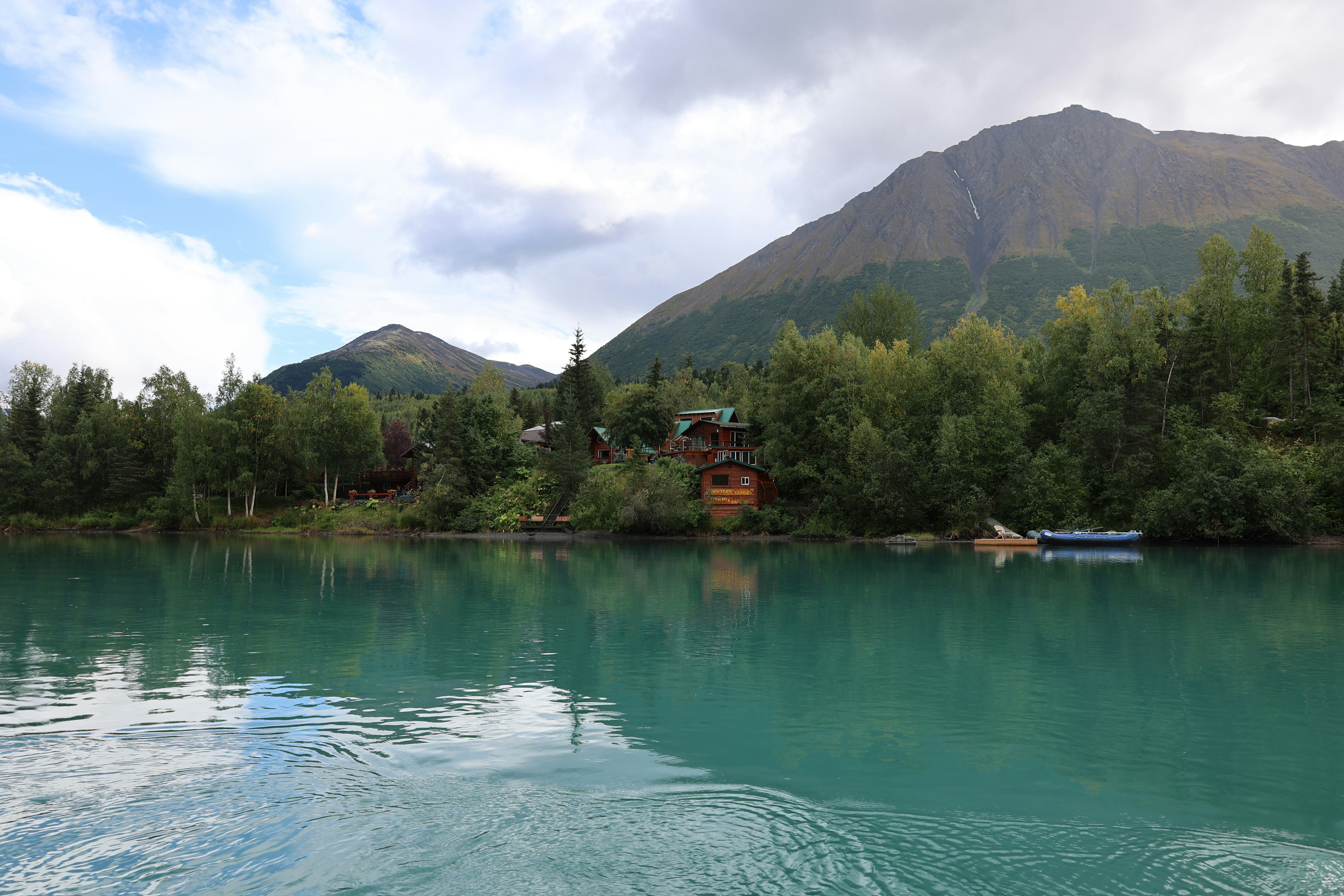 Serene Waterside Retreat Beneath Majestic Peaks