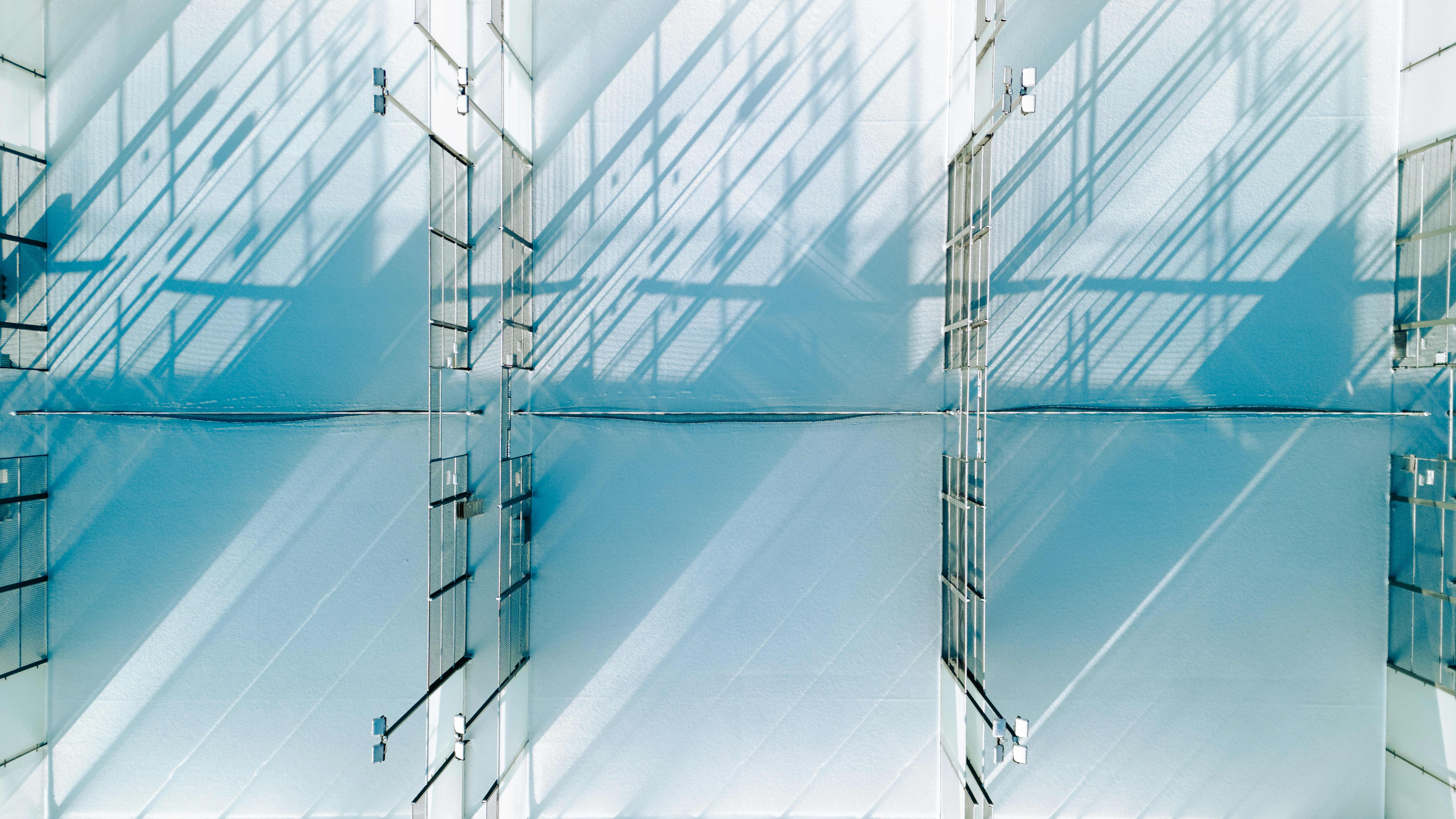 Geometric Shadows on Frosted Glass FacadePhilip Myrtorp