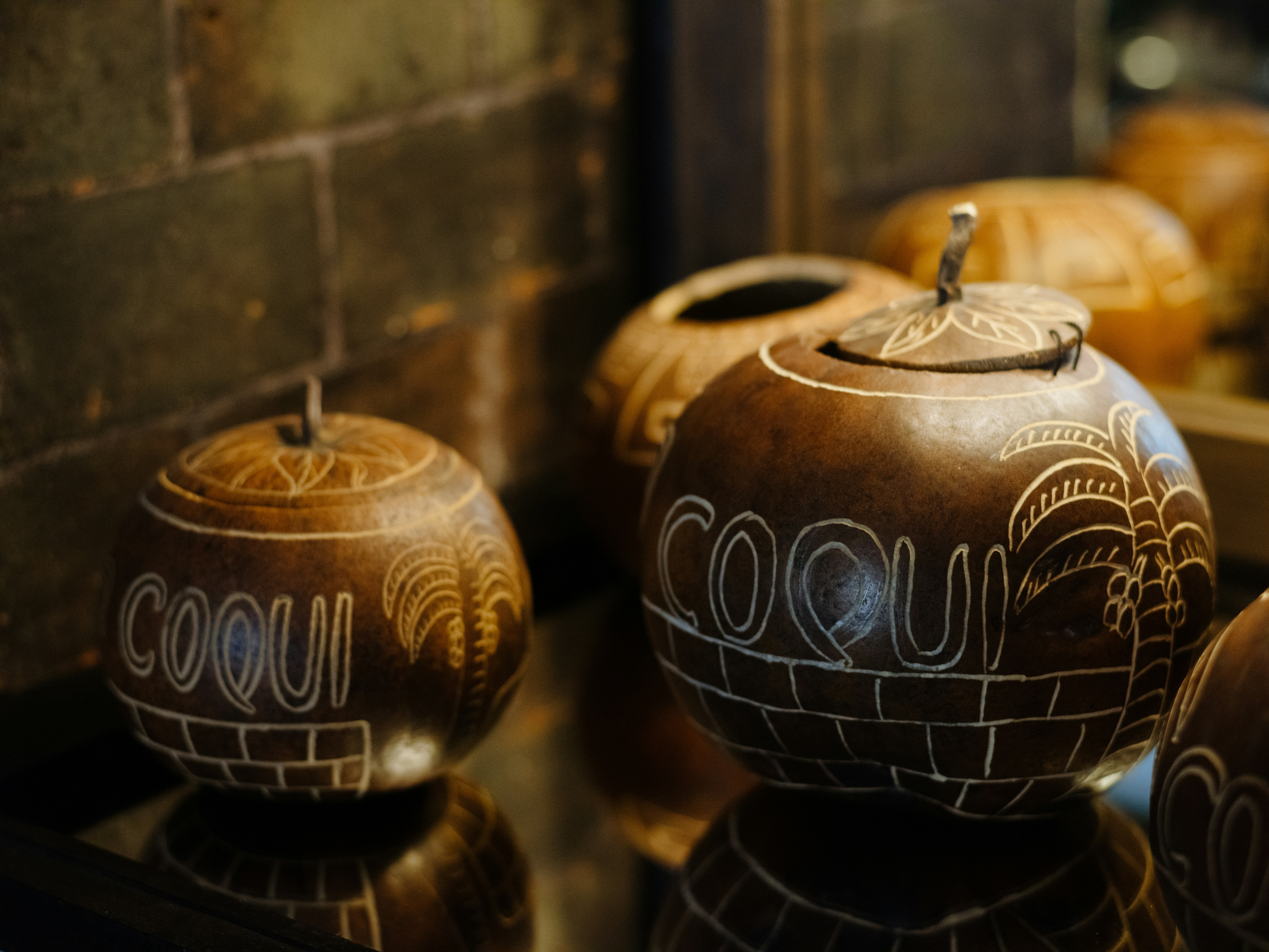 Amber Echoes on Chalk-etched Jars Reflecting on a Quiet Surface