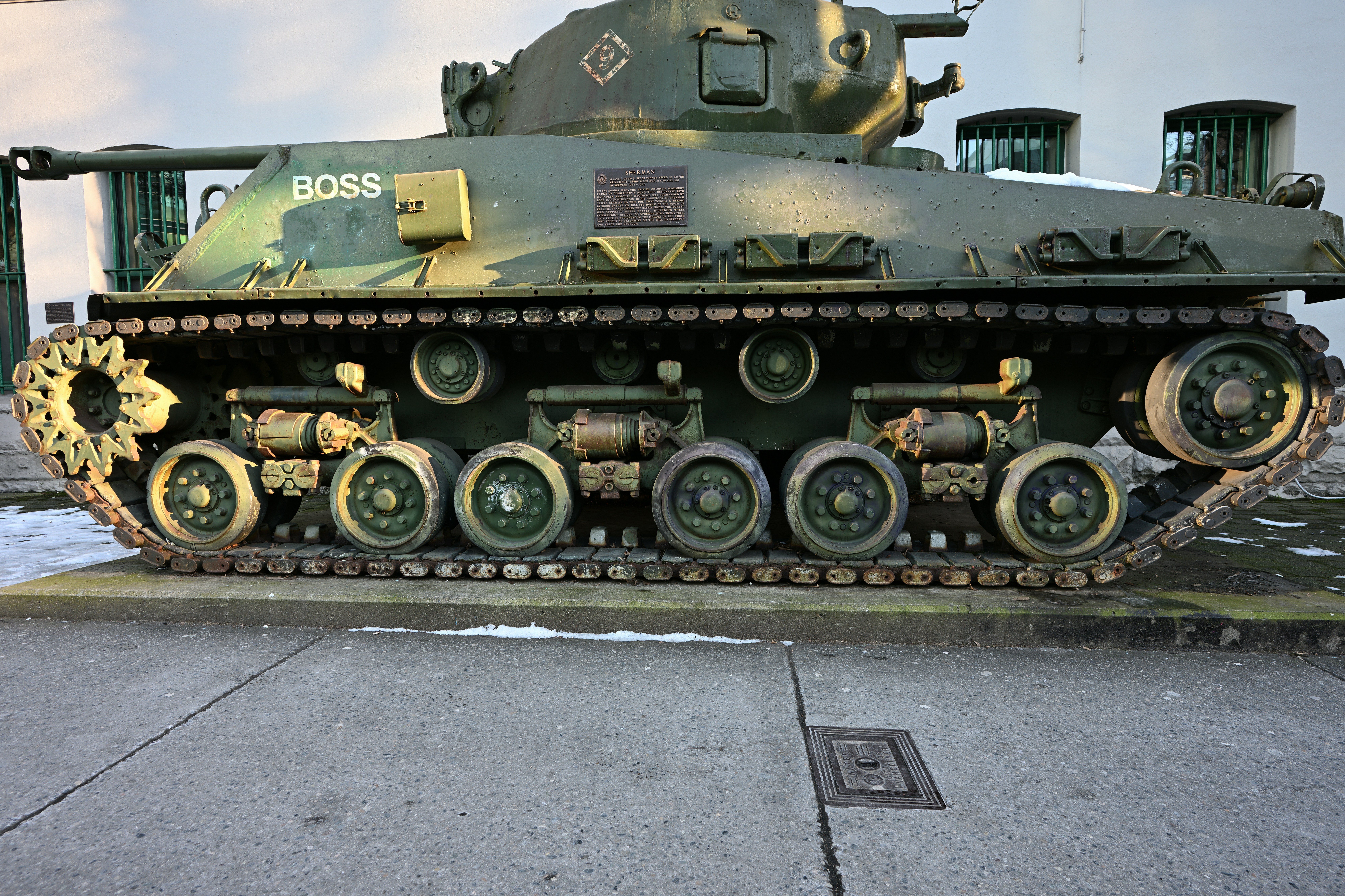 A green tank sitting on top of a sidewalk photo – Free Beatty st Image ...
