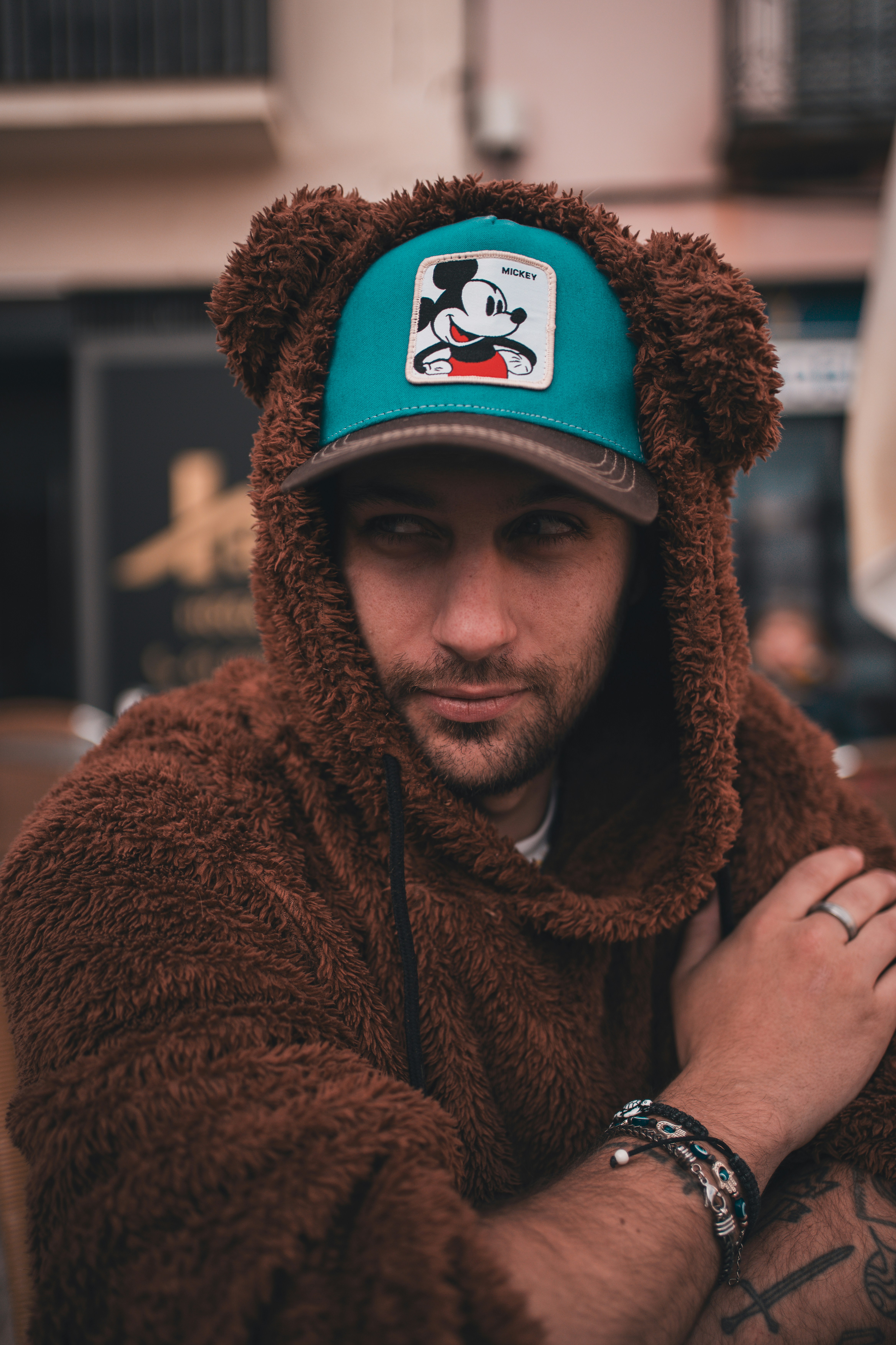 Mickey Mesh: A Bear‑hugged Portrait in Urban Light