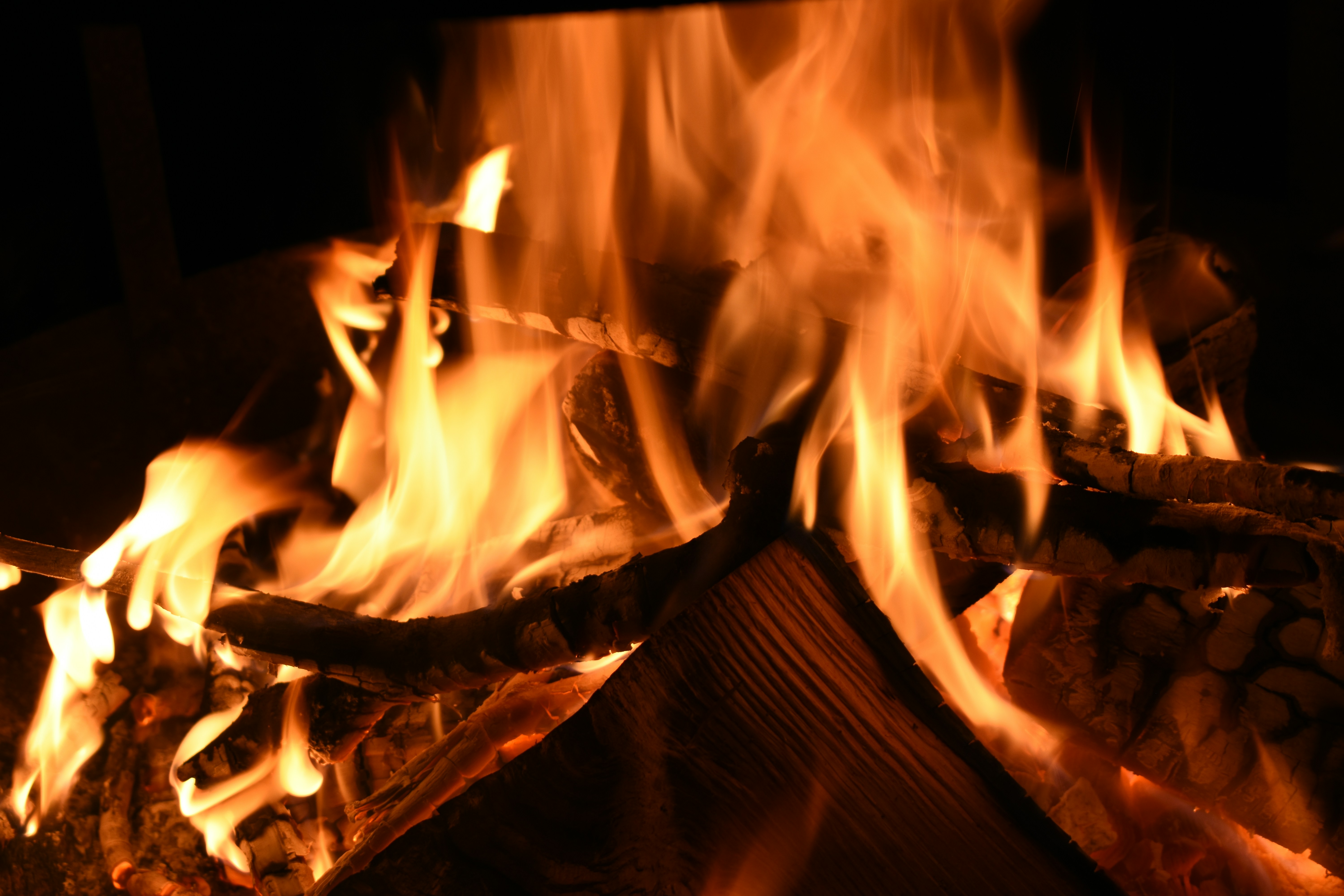 A close up of a fire in a fireplace photo – Free Fire Image on Unsplash