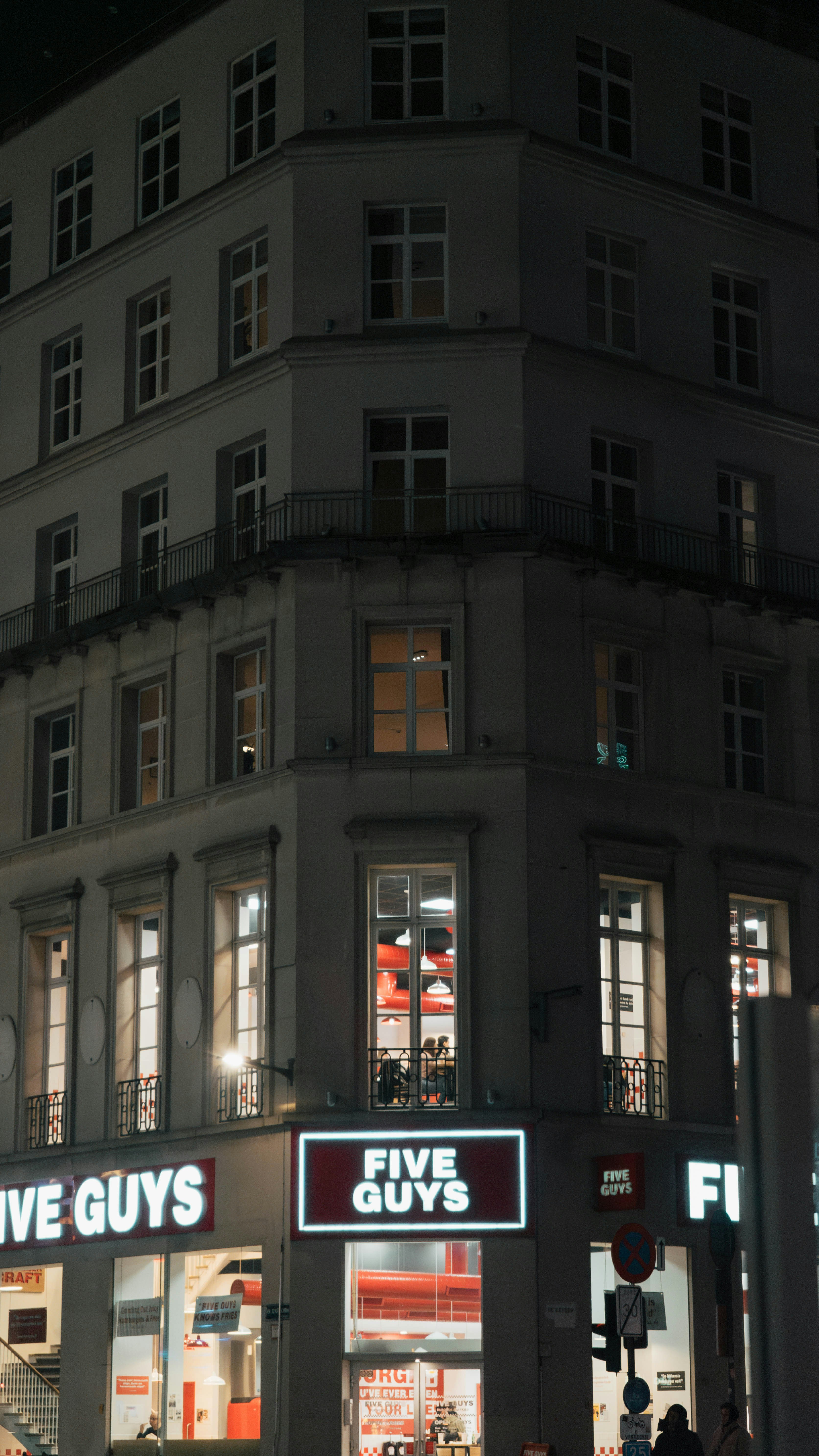 Neon Nights: Five Guys Illuminates a Corner of the City