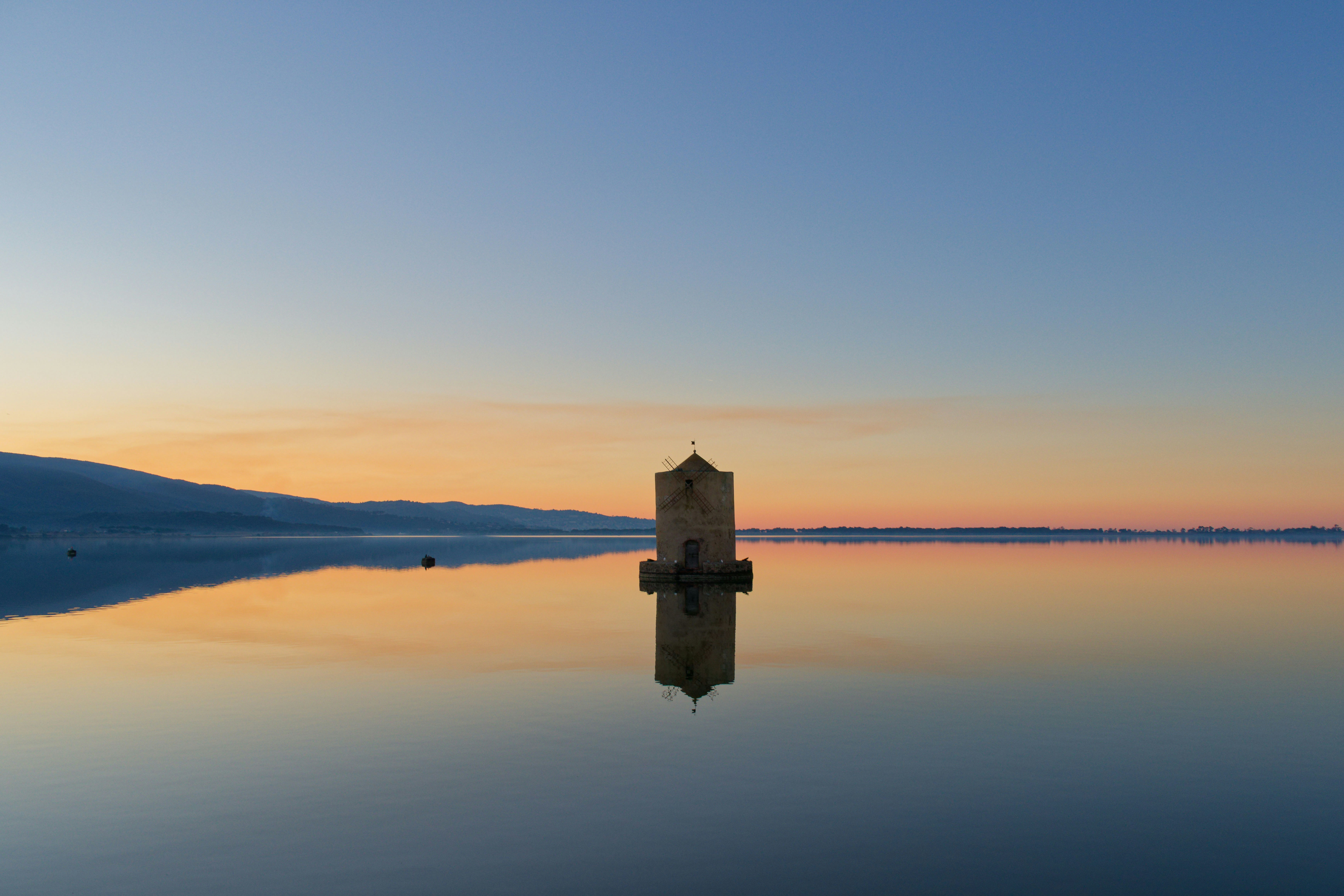 Solitary Tower at Dawn's Mirror