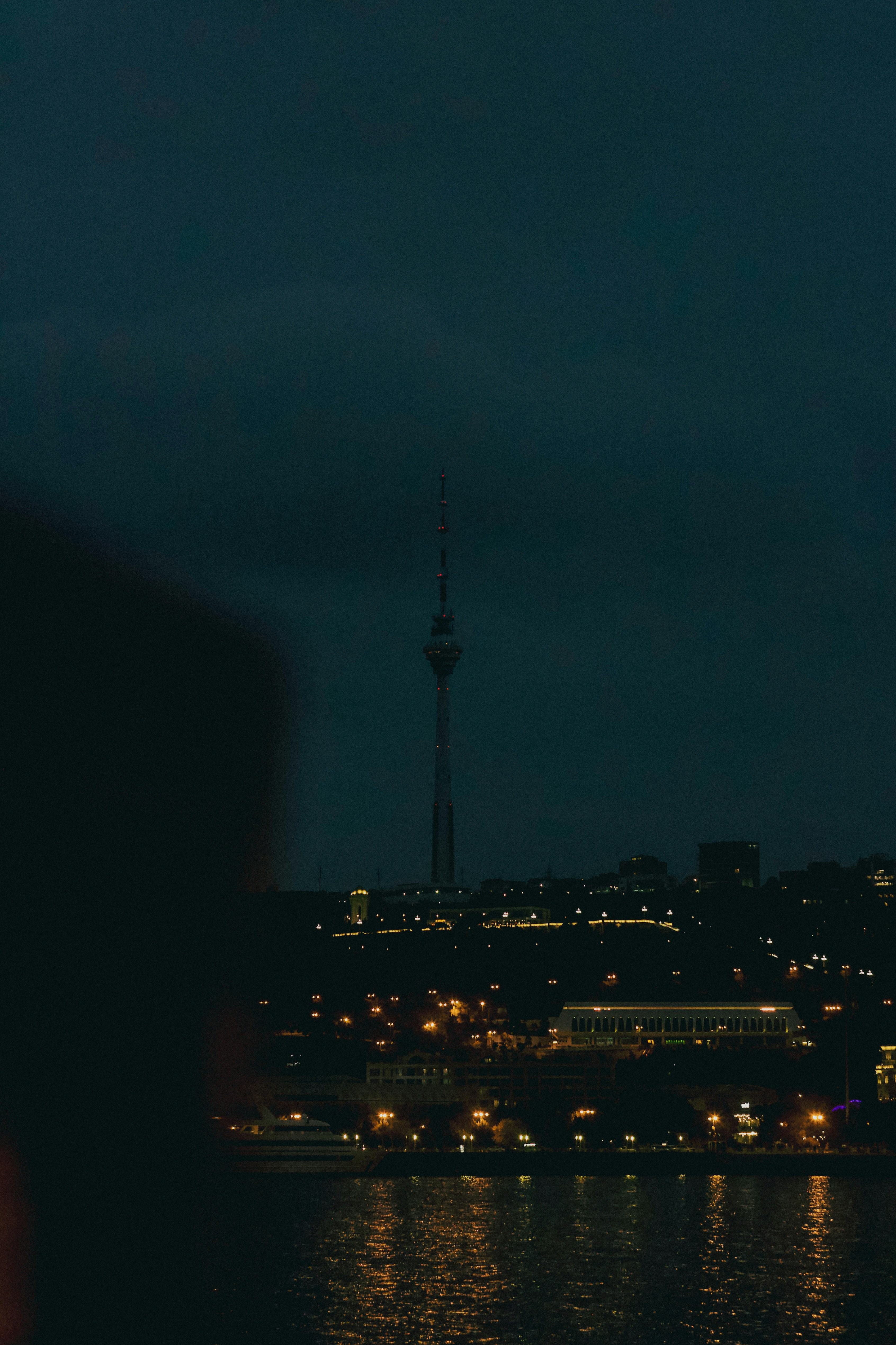 Whispers of the Night: A Tower Illuminated
