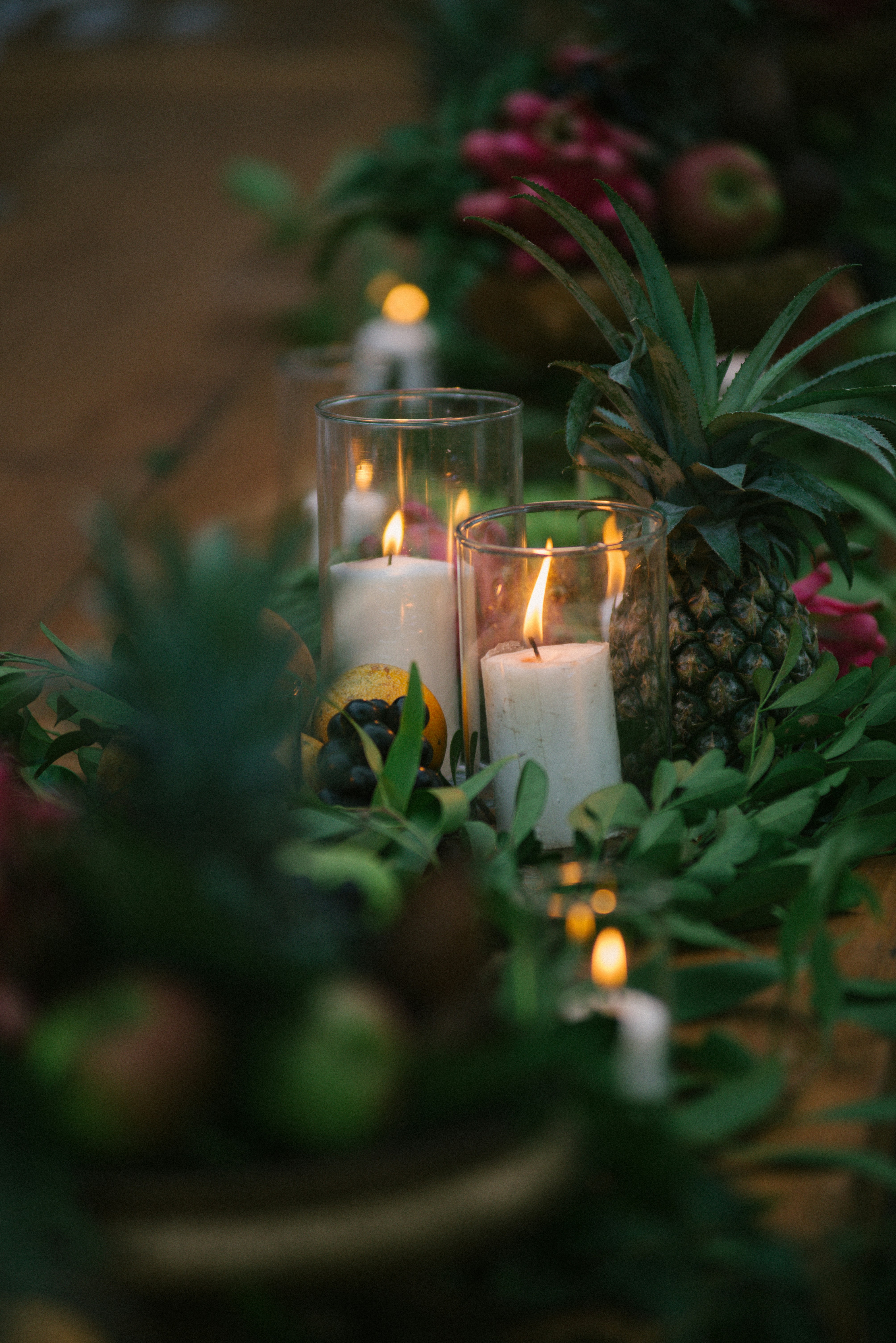 Glow Among Pineapples: A Candlelit Tabletop Arrangement