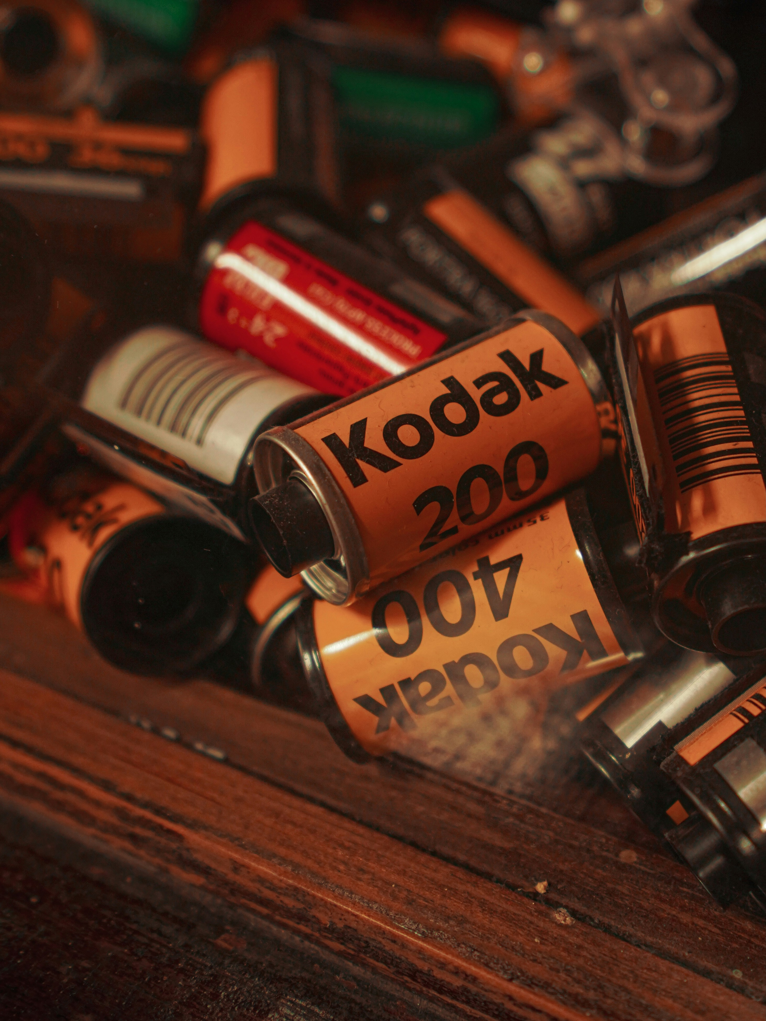 Close-up of old rolls of film piled up on a window.