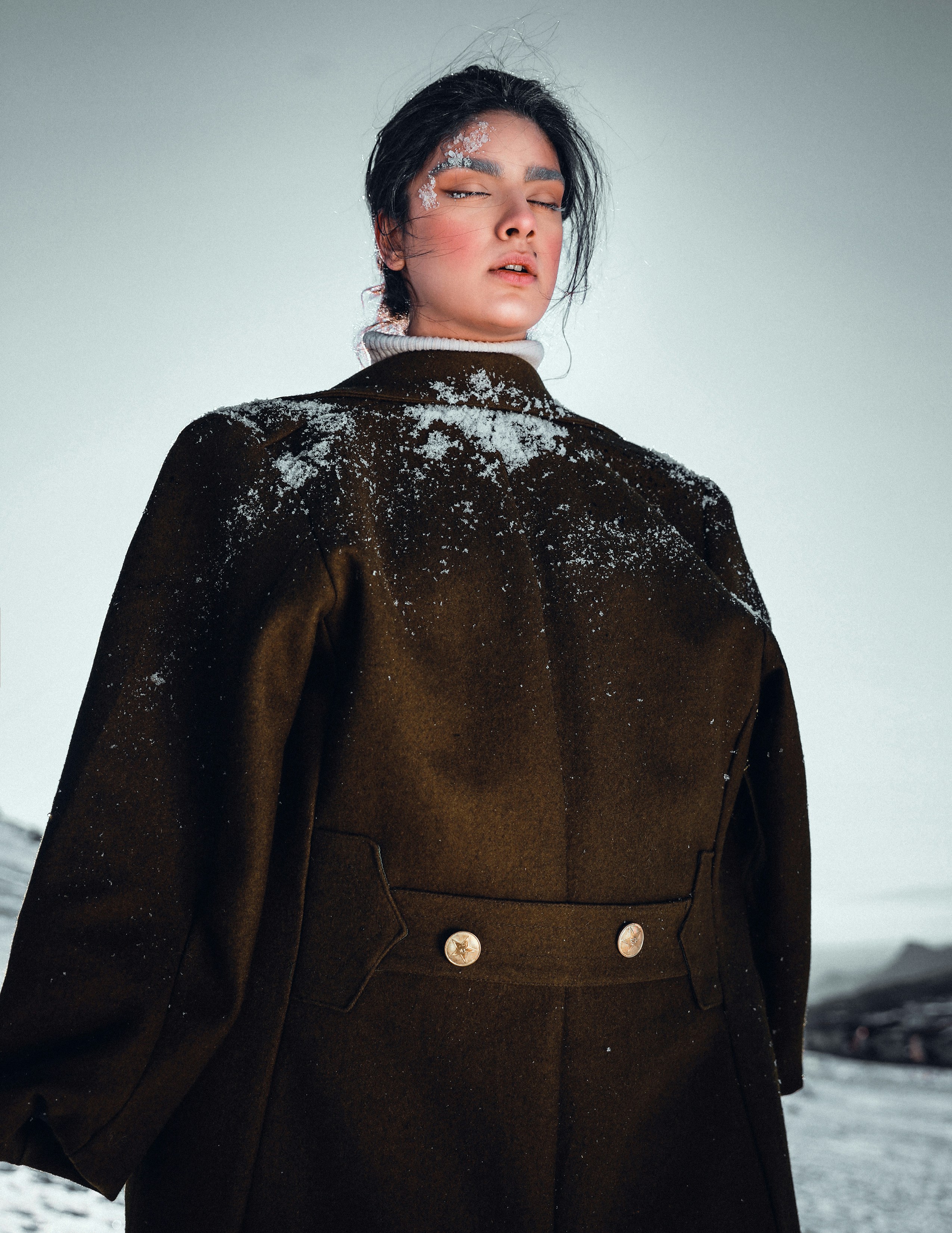 Snowfall Portrait in a Winter Coat