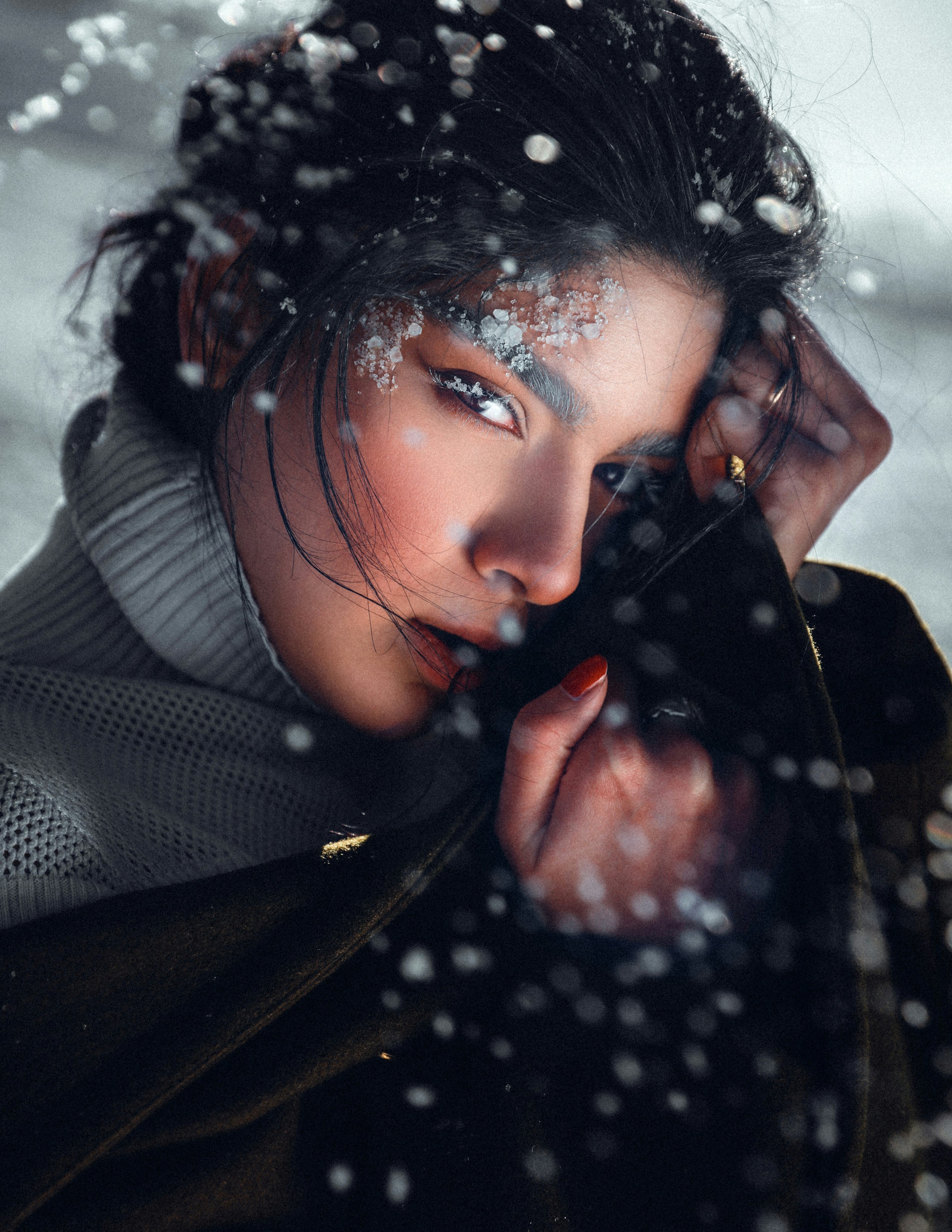 Snowfall Portrait: A Glance Through Frosted Veil