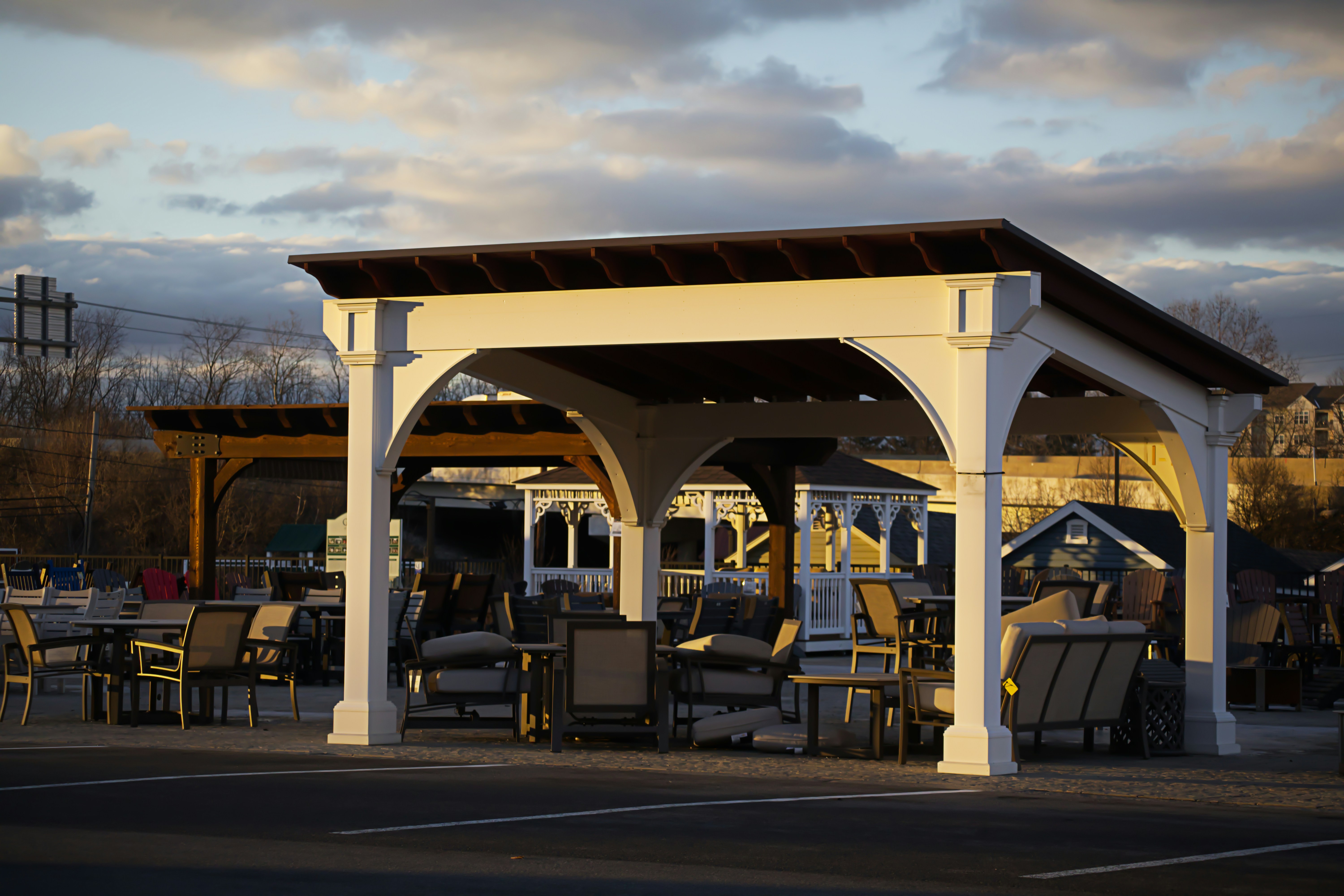 A group of chairs sitting under a covered area