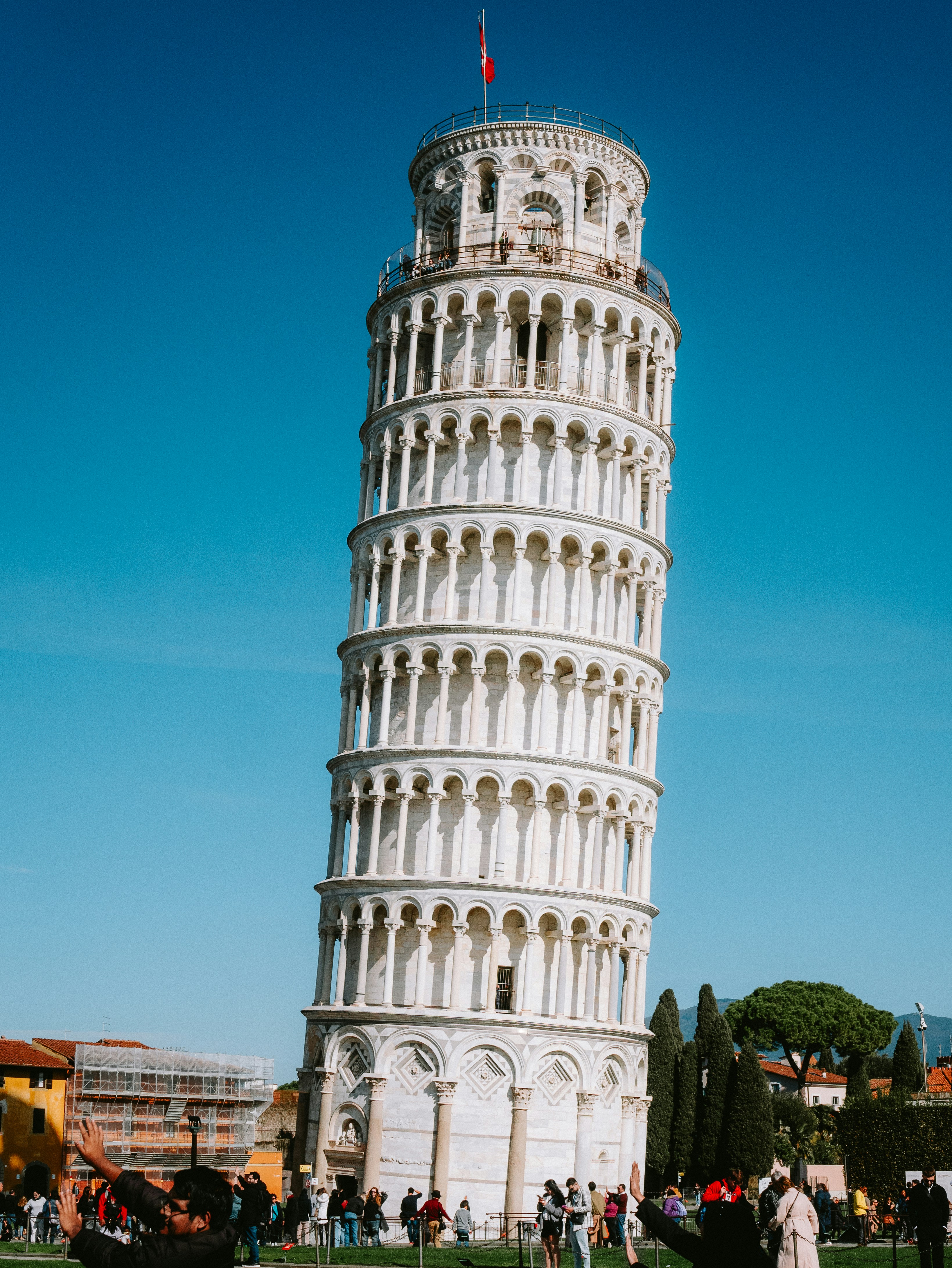 Cantilevered Marble: The Leaning Tower of Pisa Framed by a Cerulean Sky