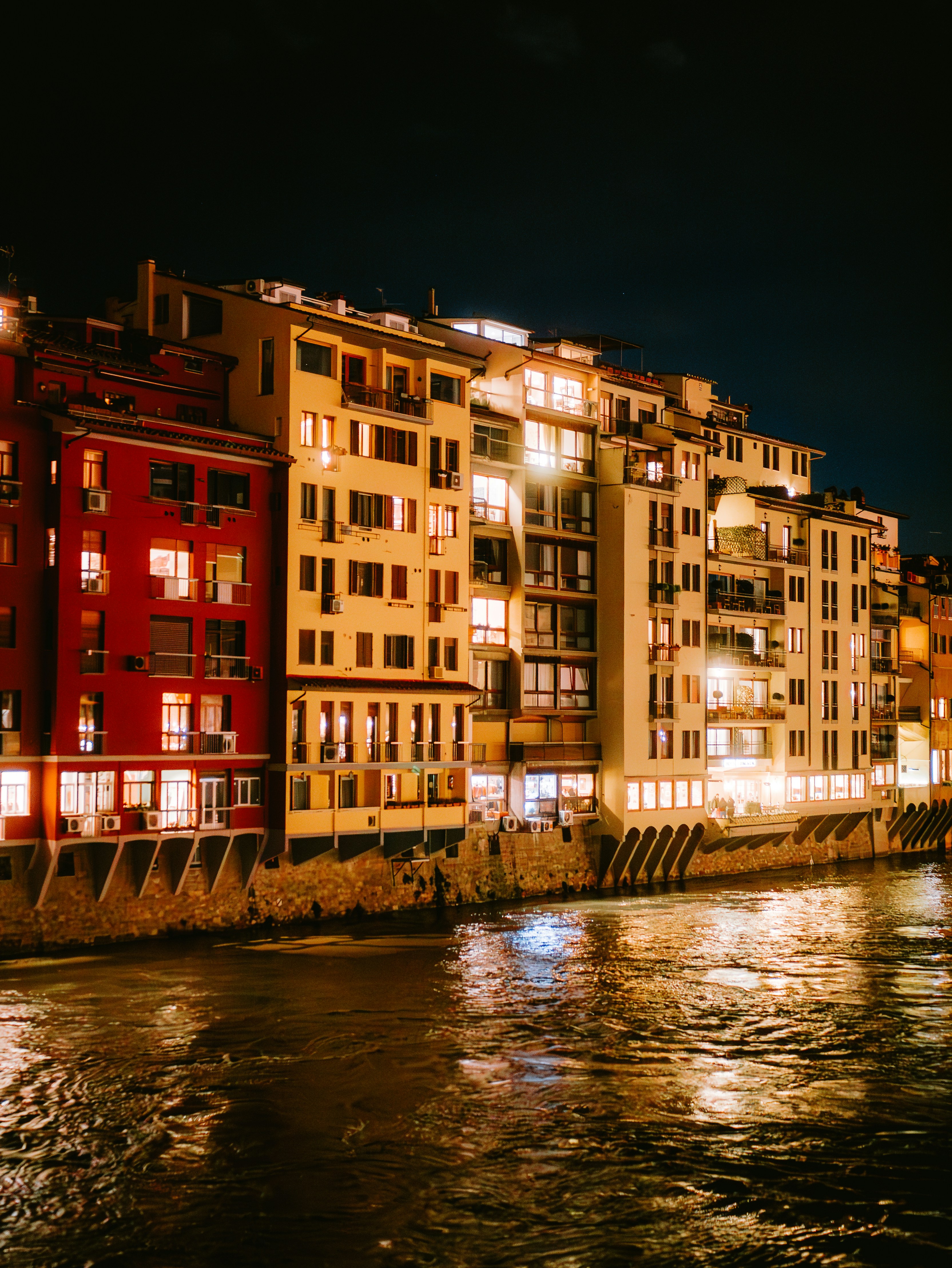 Riverfront Apartments Glow: Nightlife Along the Water