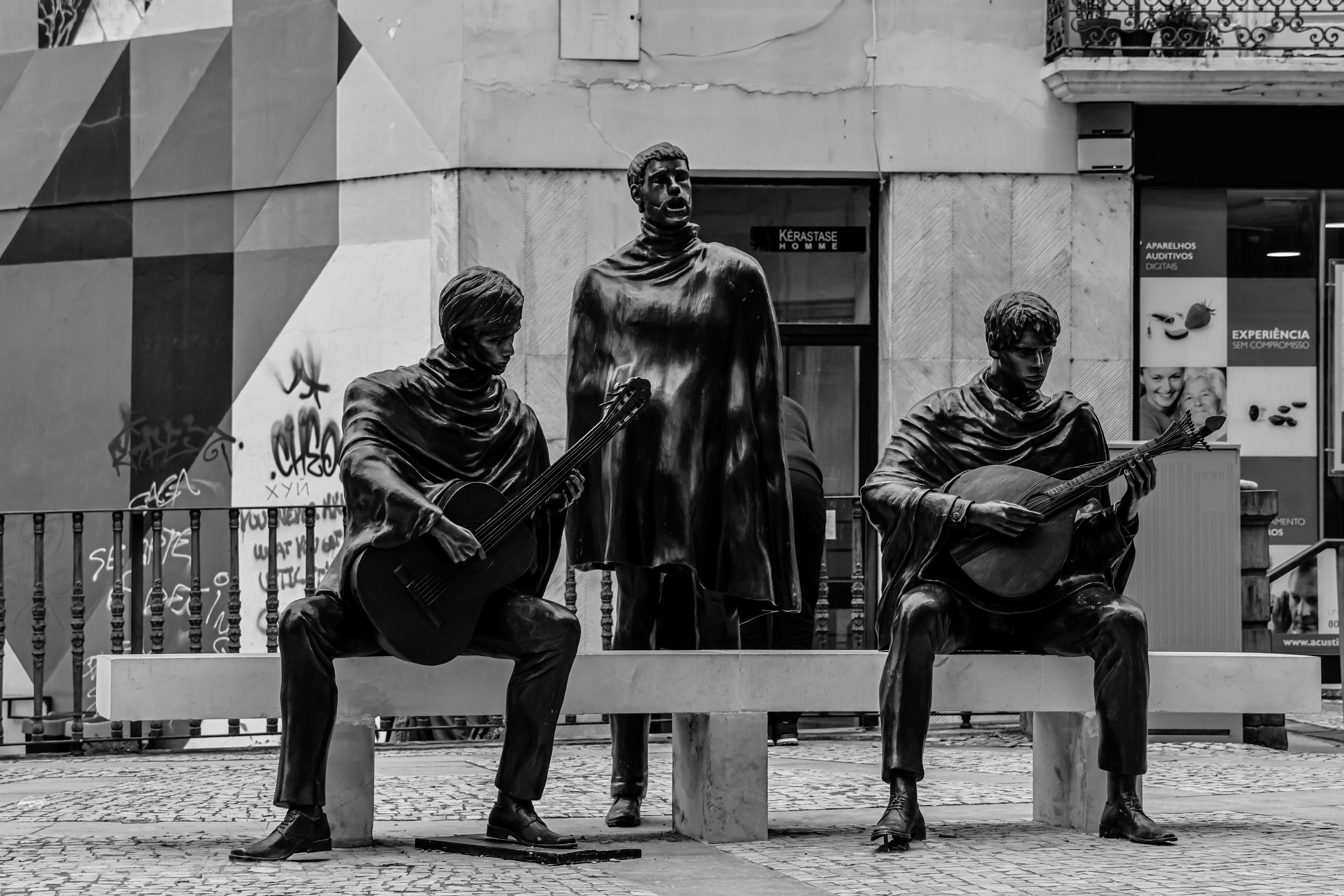 Monochrome Ensemble: The Standing Maestro Surrounded by Guitarists