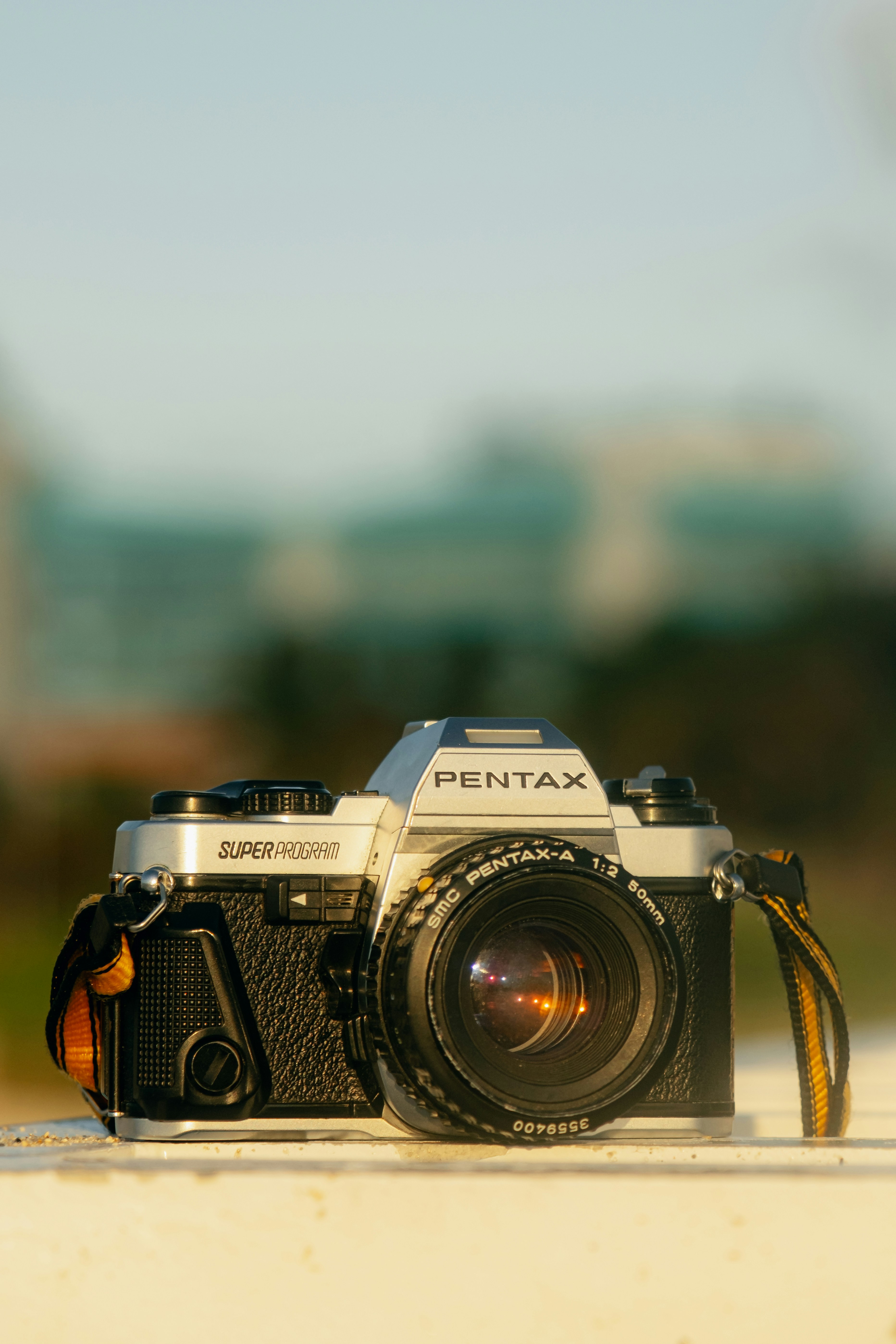 A camera sitting on top of a sidewalk photo – Free Photo Image on Unsplash