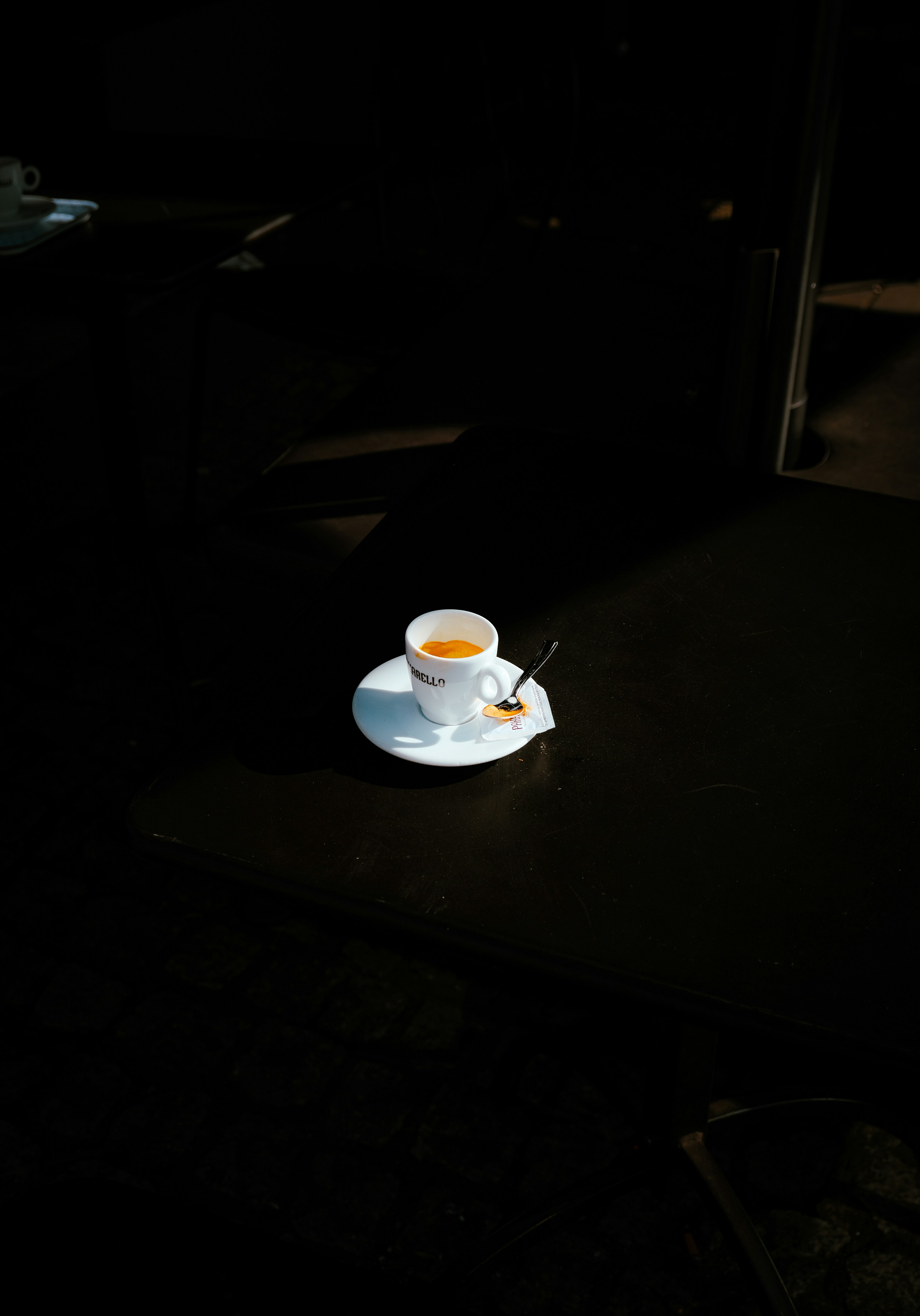 Spotlight on a Quiet Teacup: A Moment of Coffee Light
