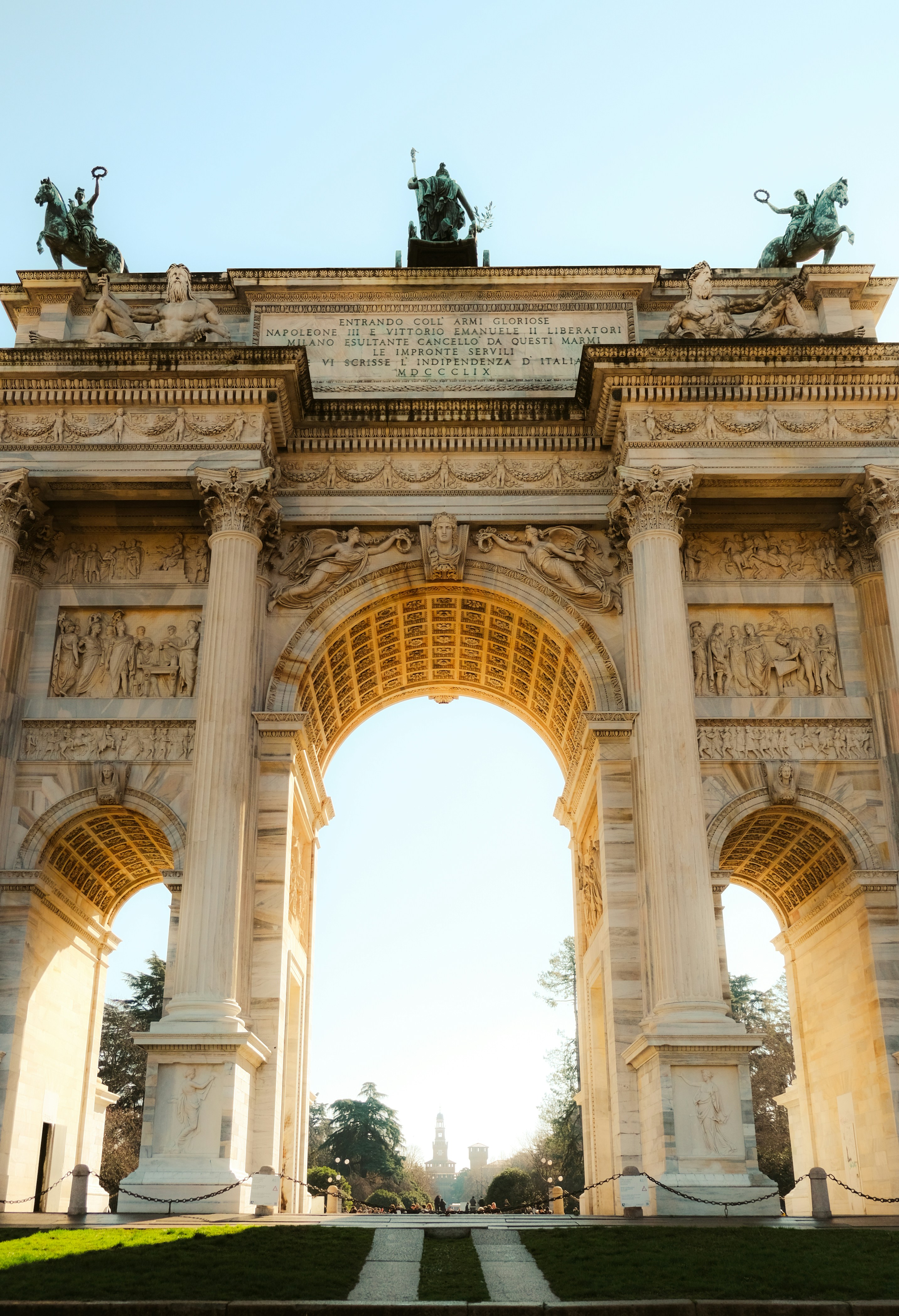 A large arch with statues on top of it photo – Free Building Image on ...