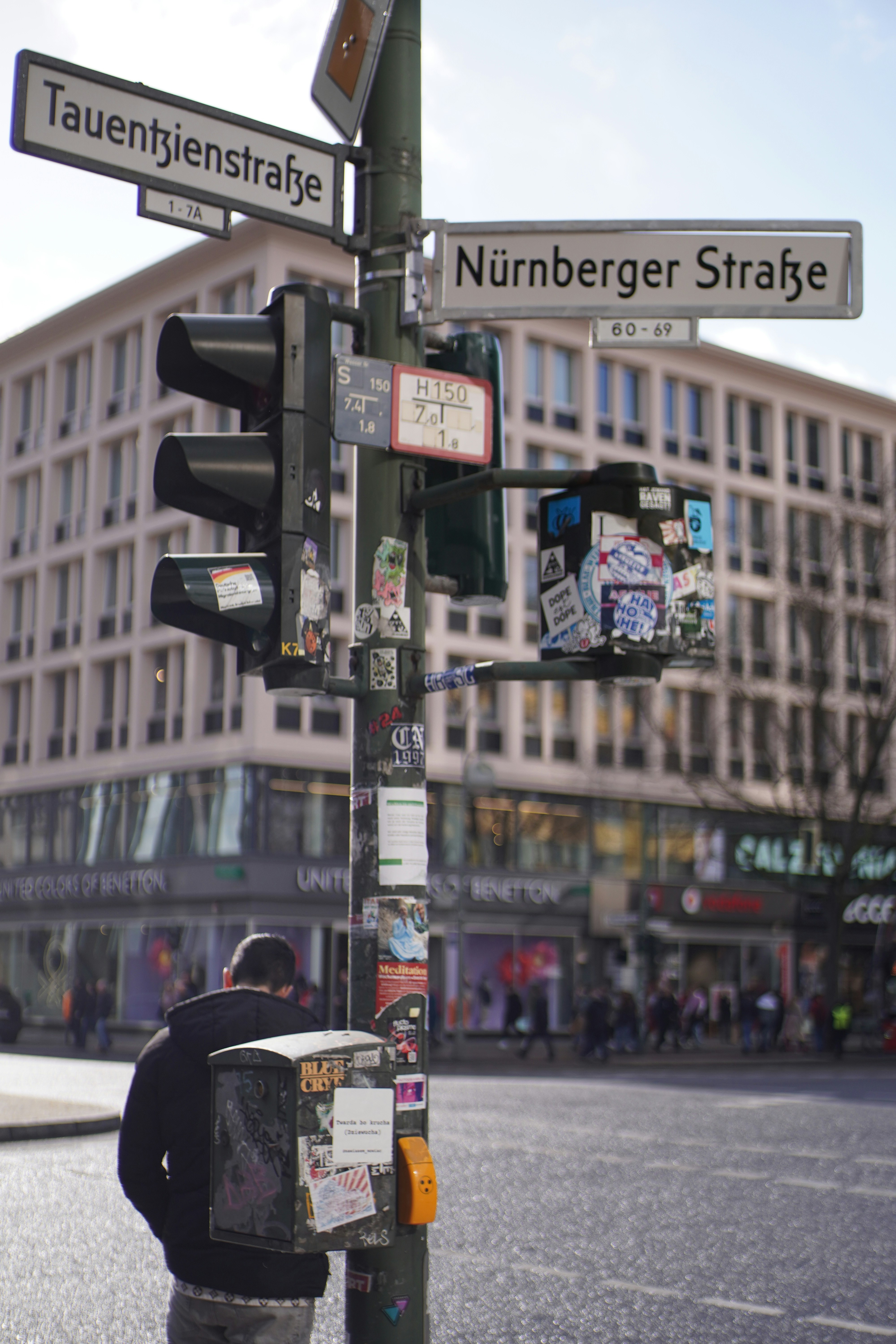 Stickered Lamppost at Tauentzienstraße and Nürnberger Straße: Berlin Intersection in Focus