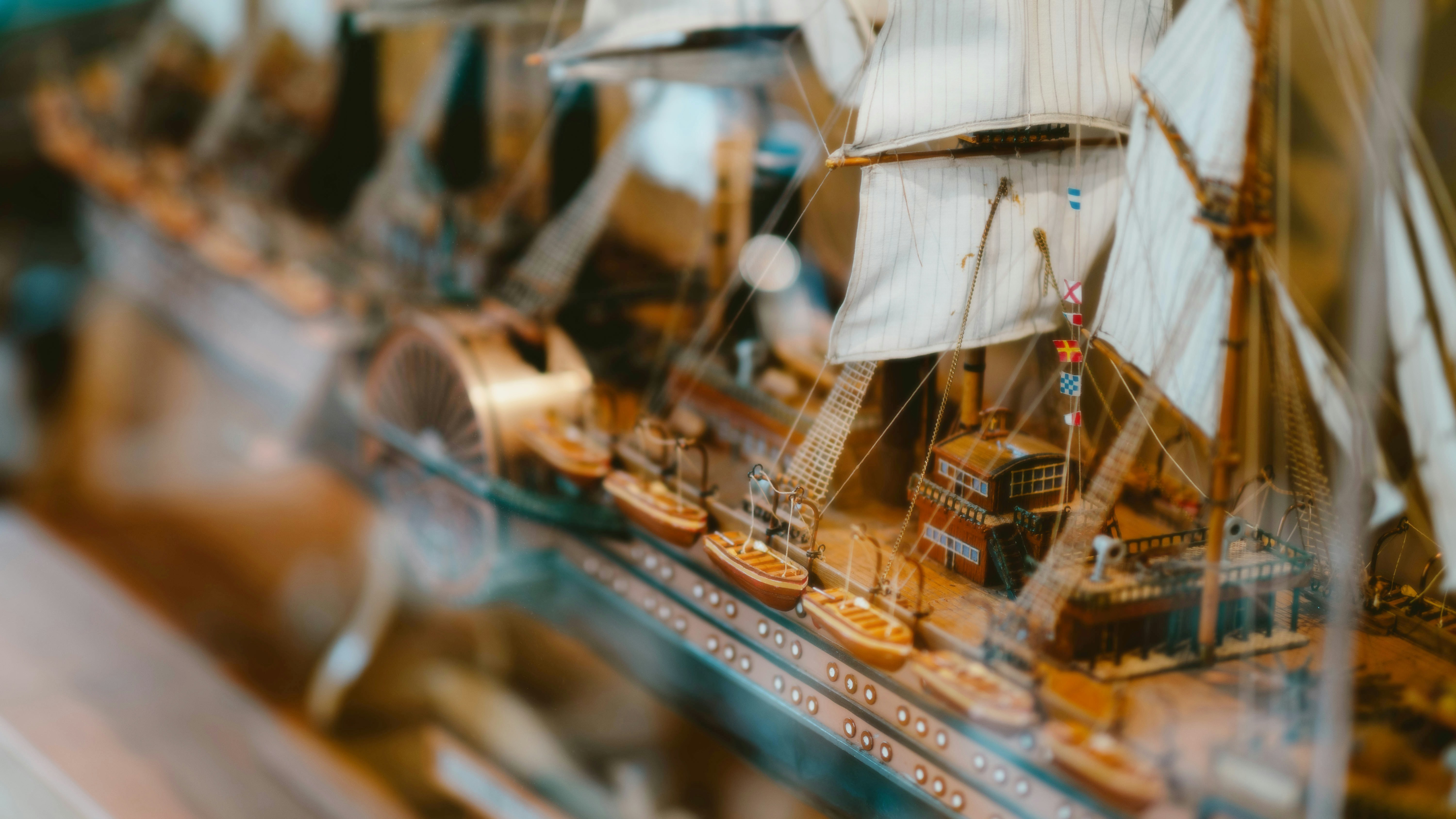 A close up of a model ship in a display case