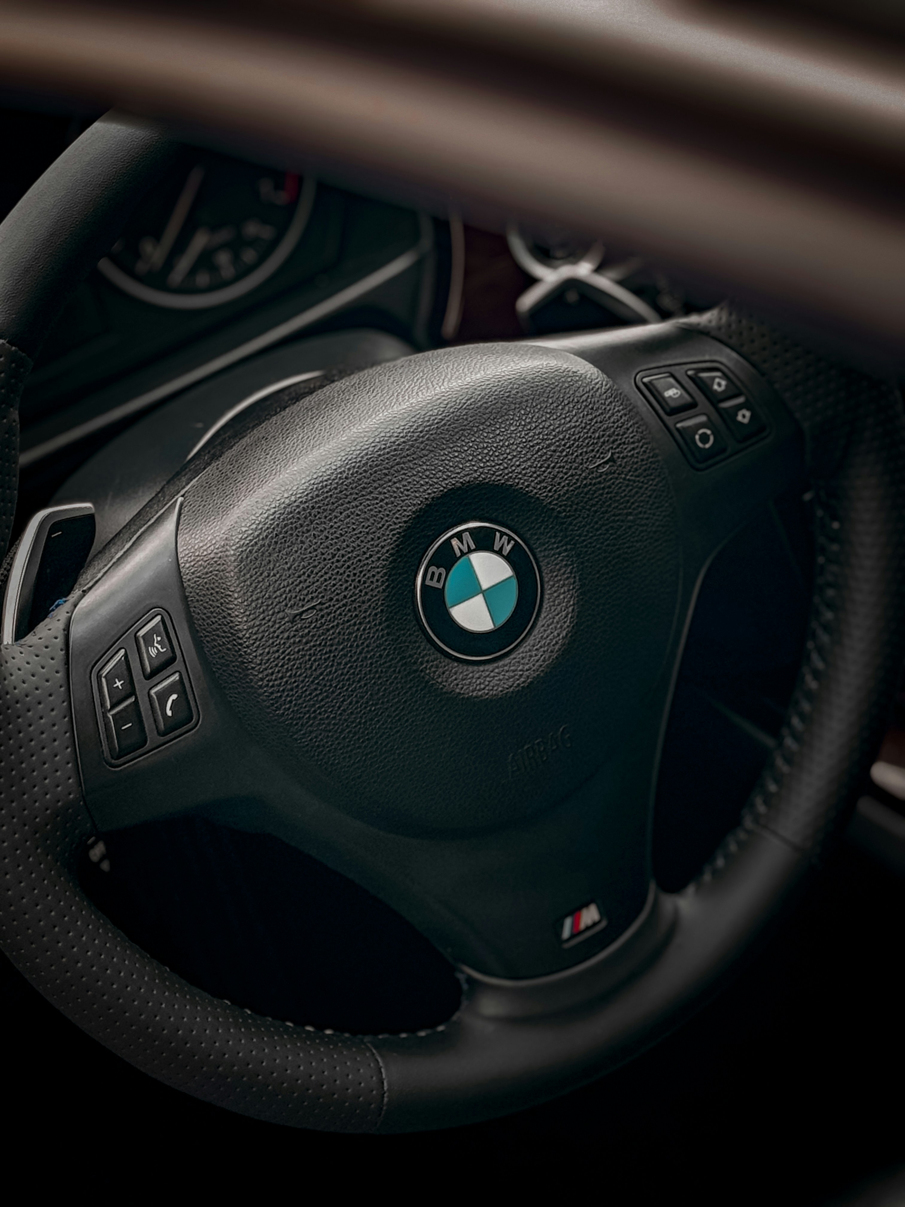 A steering wheel and dashboard of a car photo – Free Vehicle Image on ...