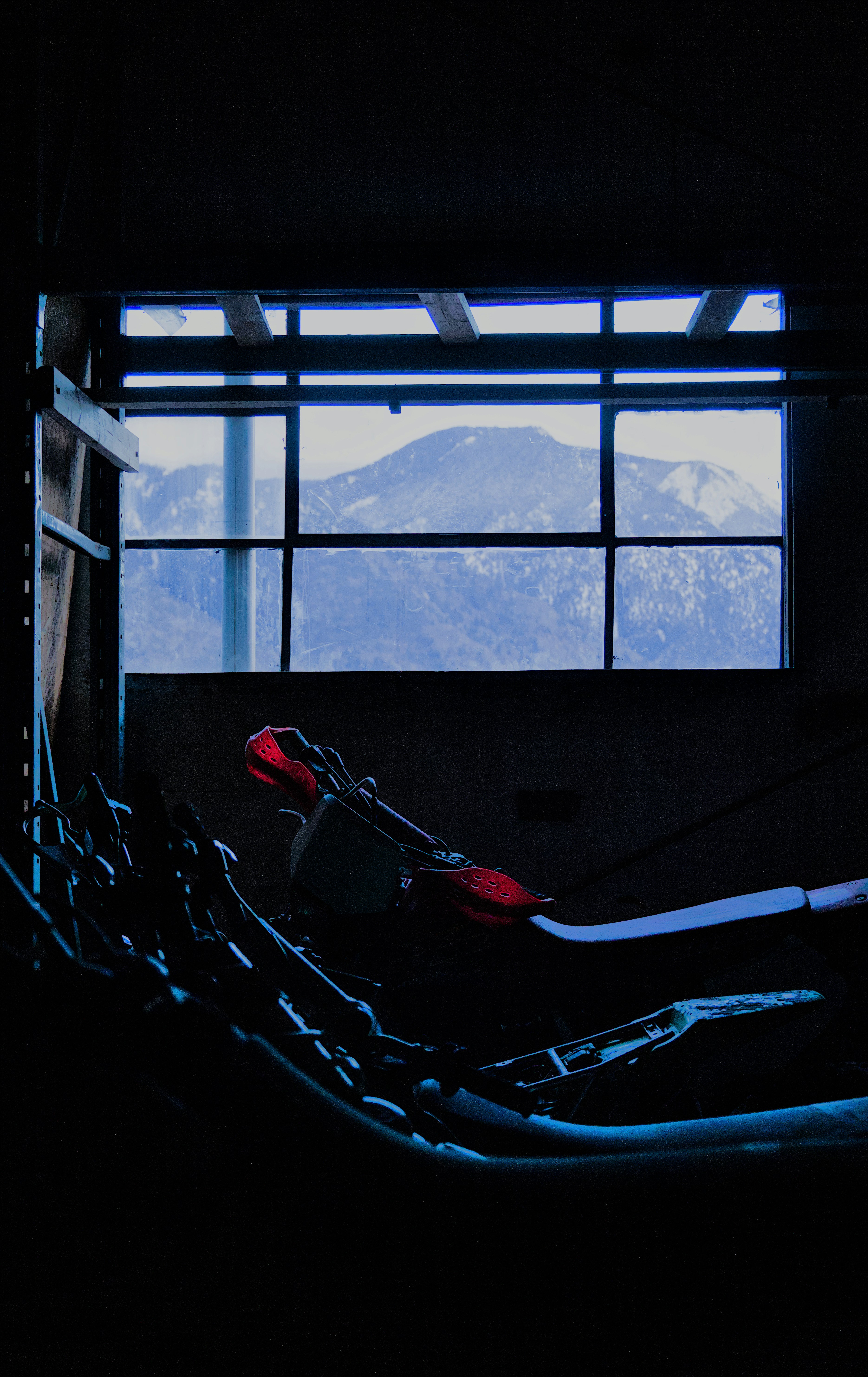 A view of a mountain through a window photo – Free Wallpaper Image on Unsplash