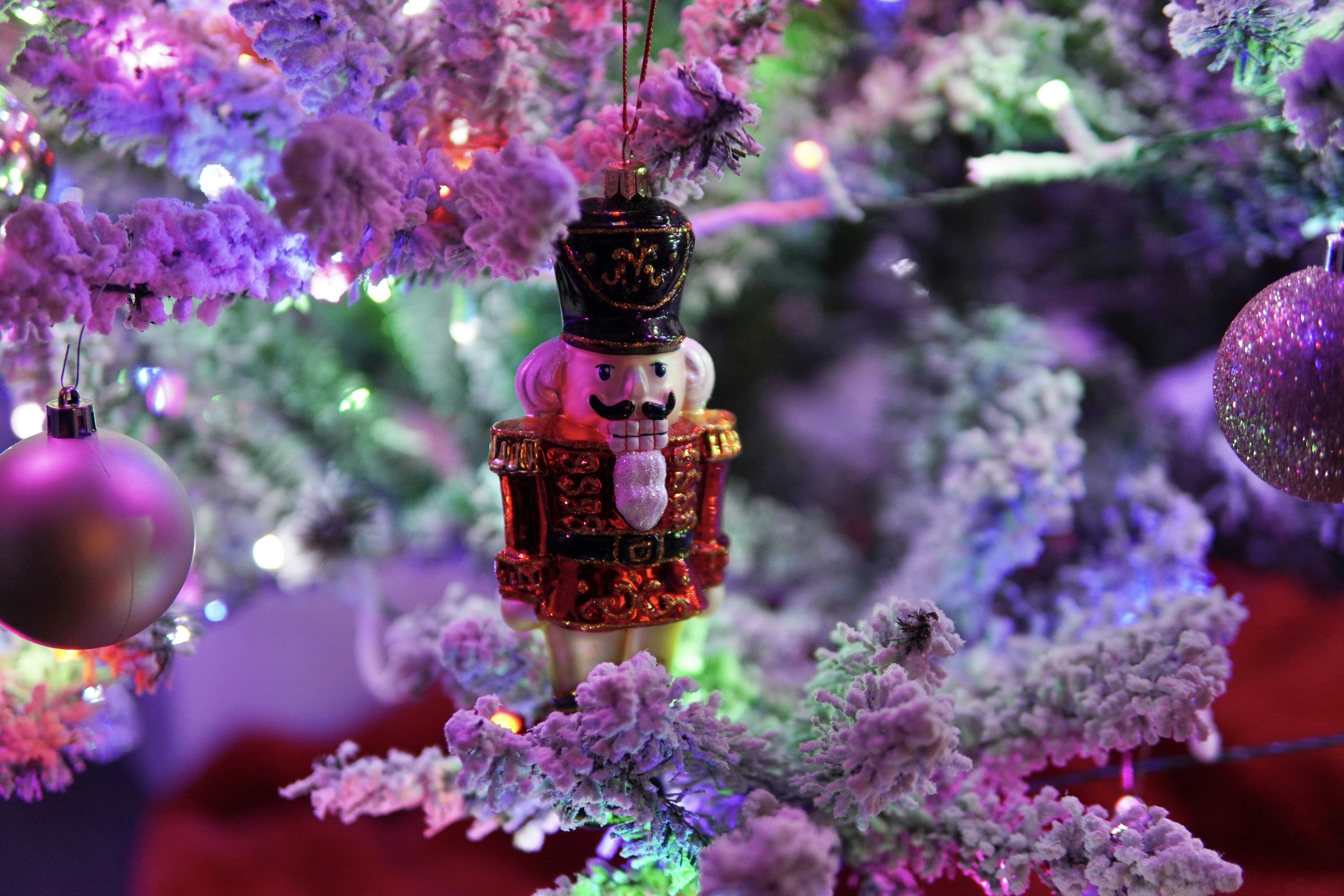 Glittering Nutcracker Among Neon Snow
