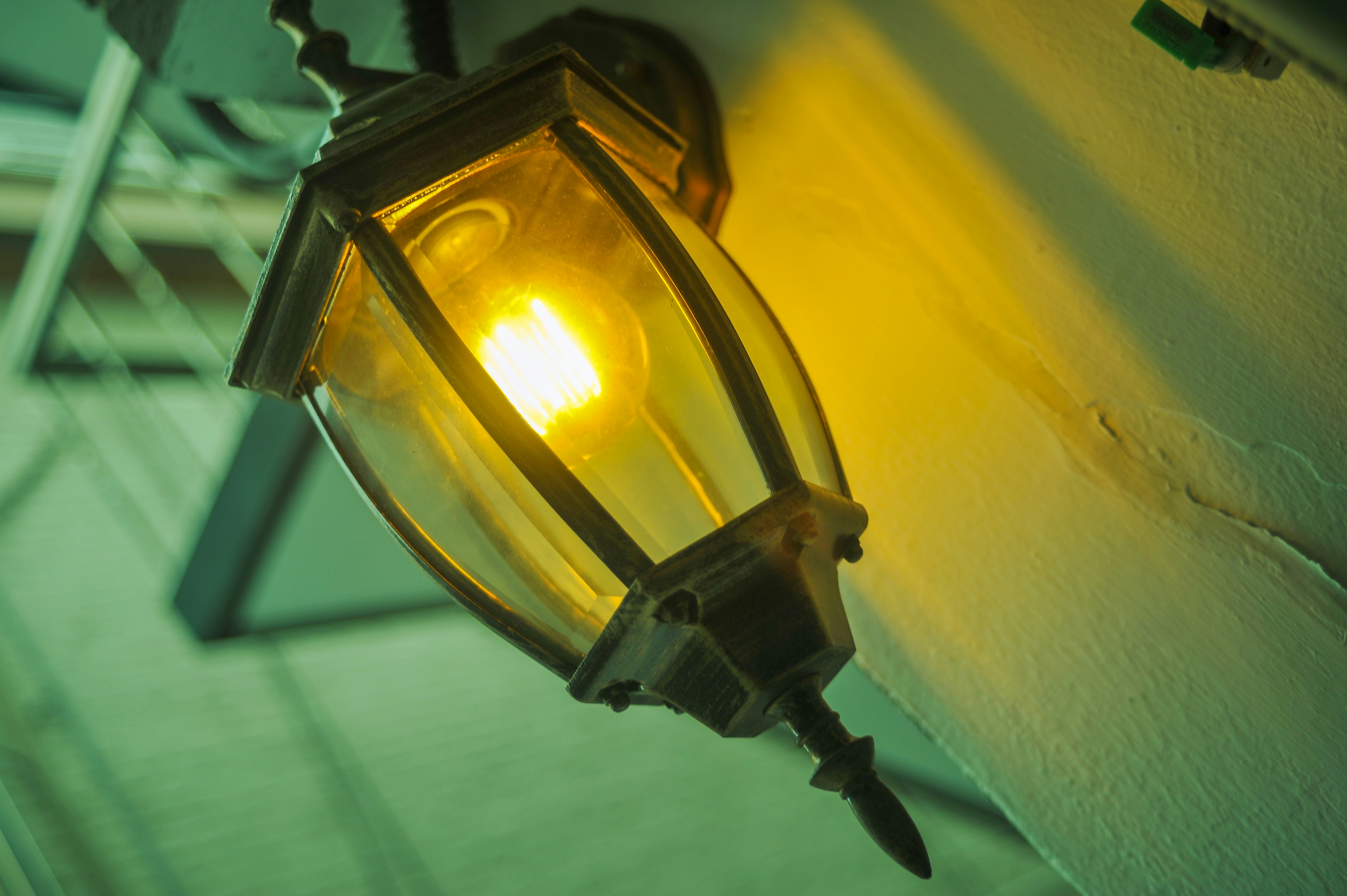 Lime-Washed Lantern: Warm Glow on a Mint Wall