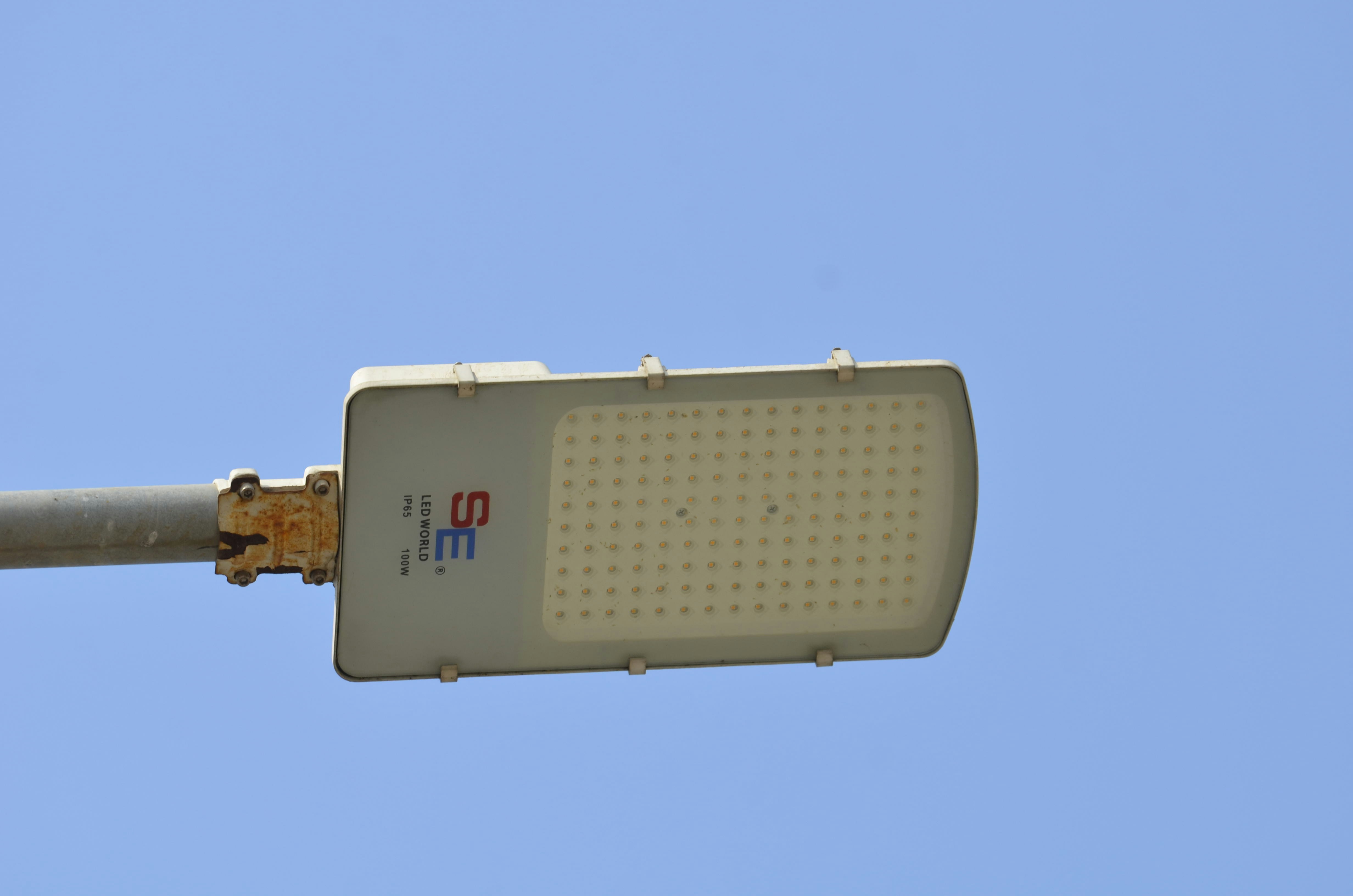Minimalist Streetlight Reaching Toward the Clear Sky