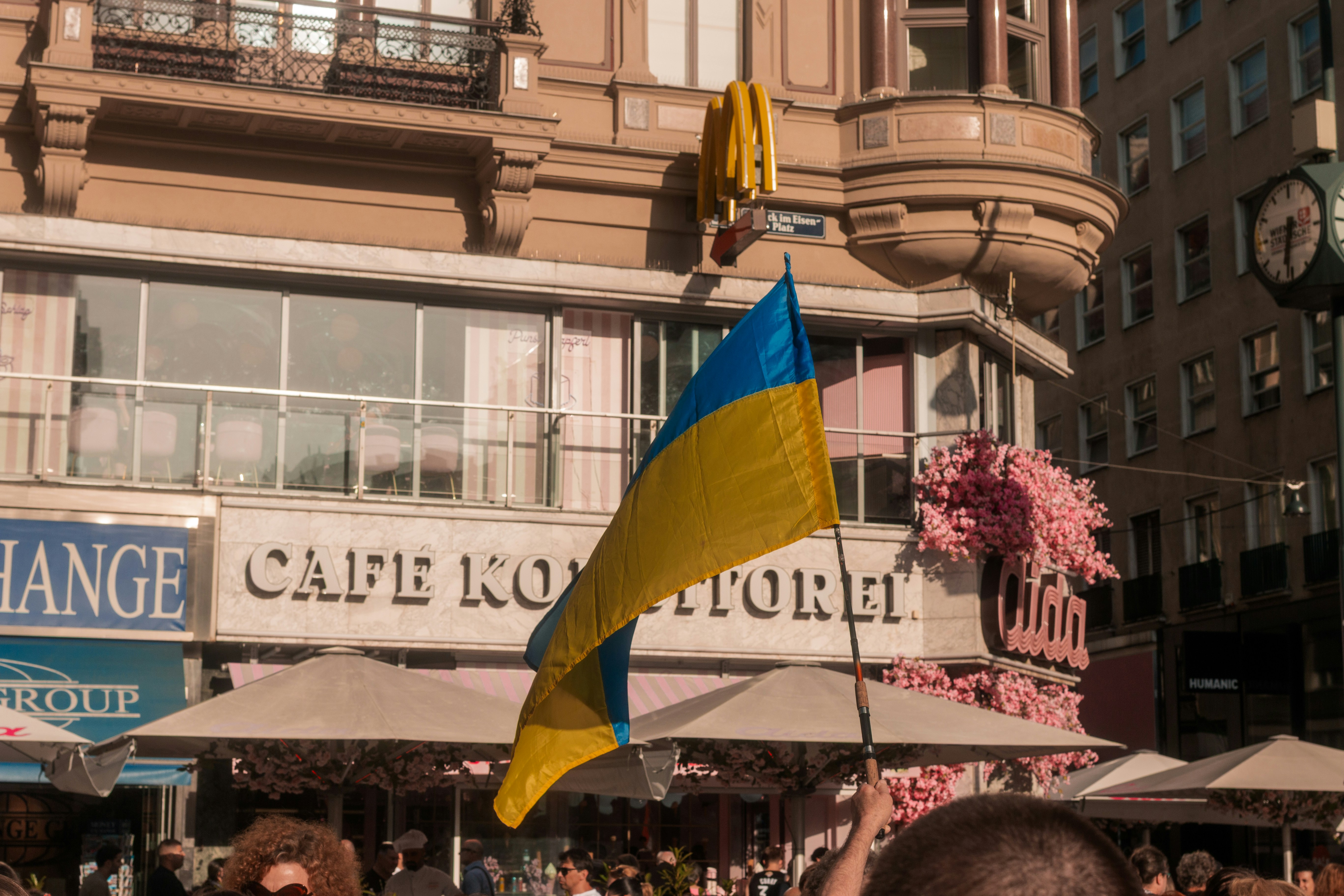 Flag of Unity over a European Street Café