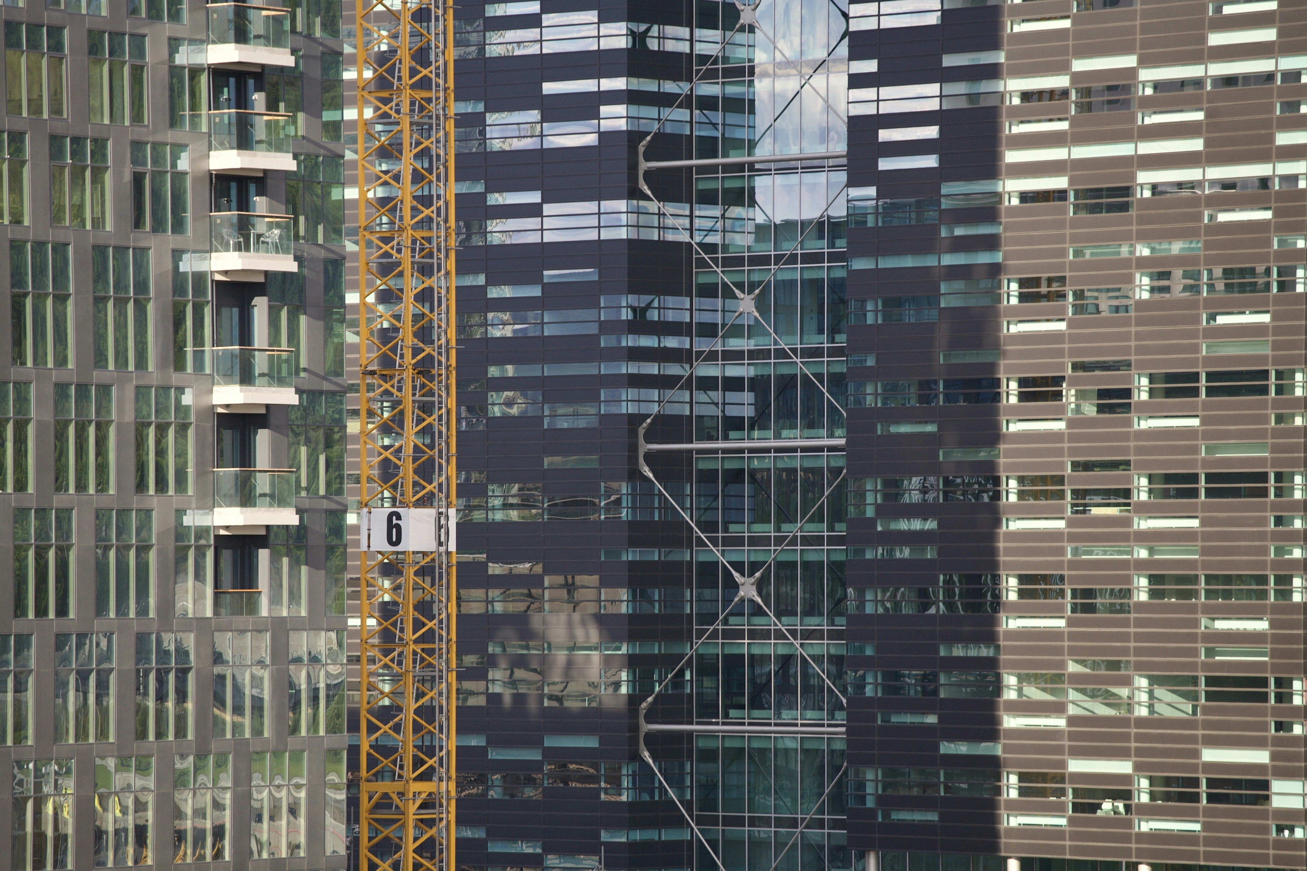 Urban Symmetry and Glass Reflections