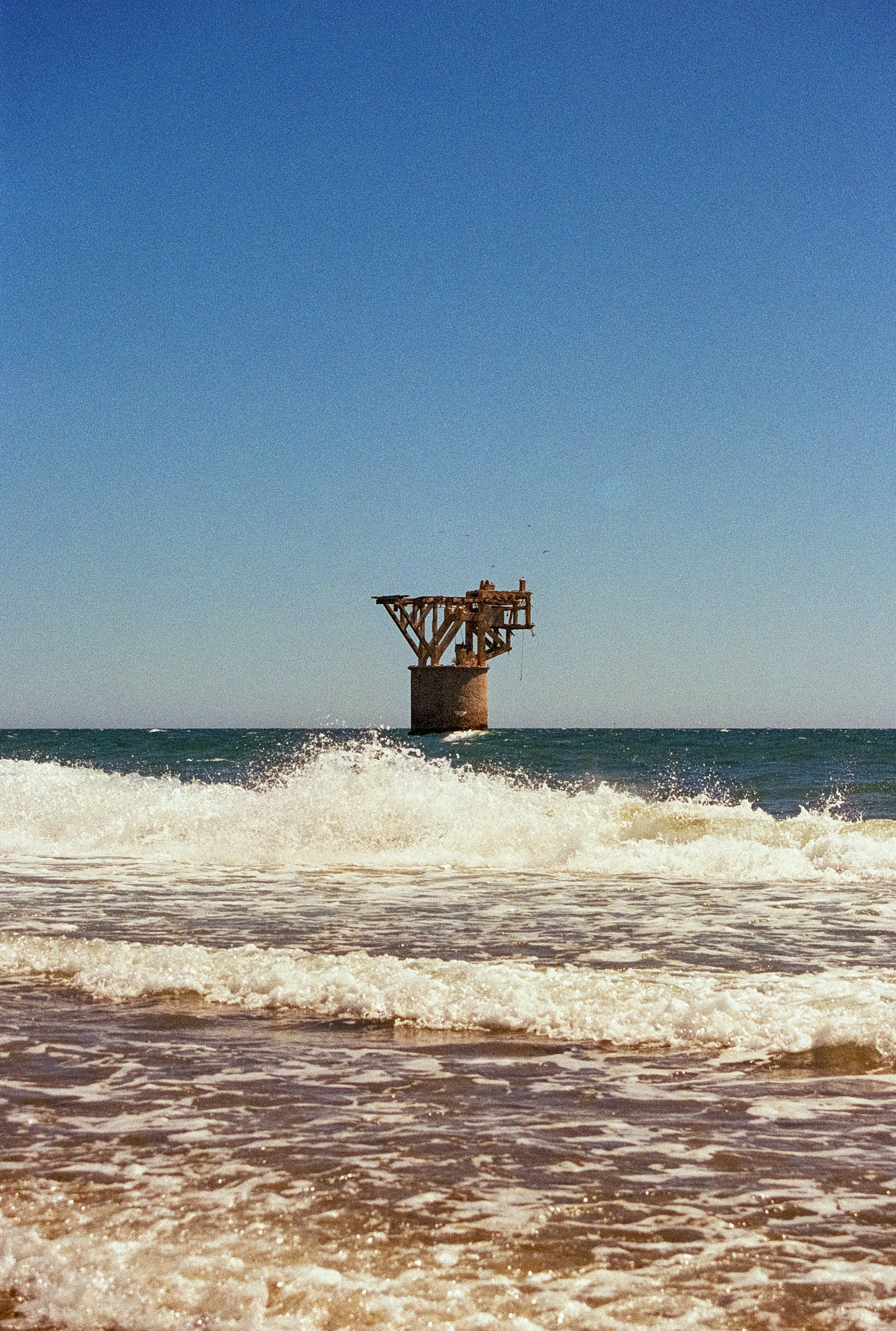 Offshore Structure Pierces the Calm Horizon